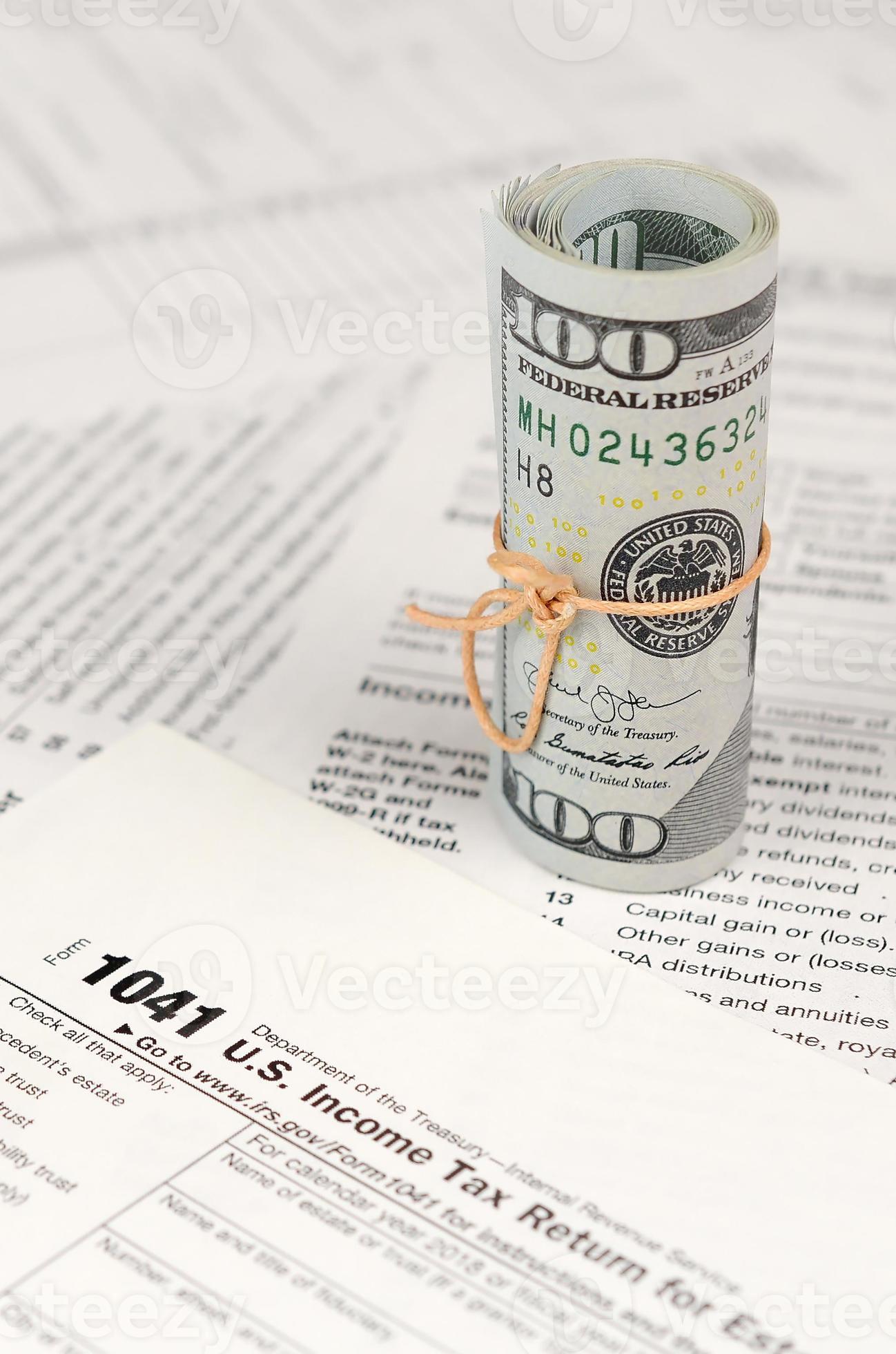 1041 U.S. Income tax return for Estates and Trusts form with roll of ... 1041 U.S. Income tax return for Estates and Trusts form with roll of ...