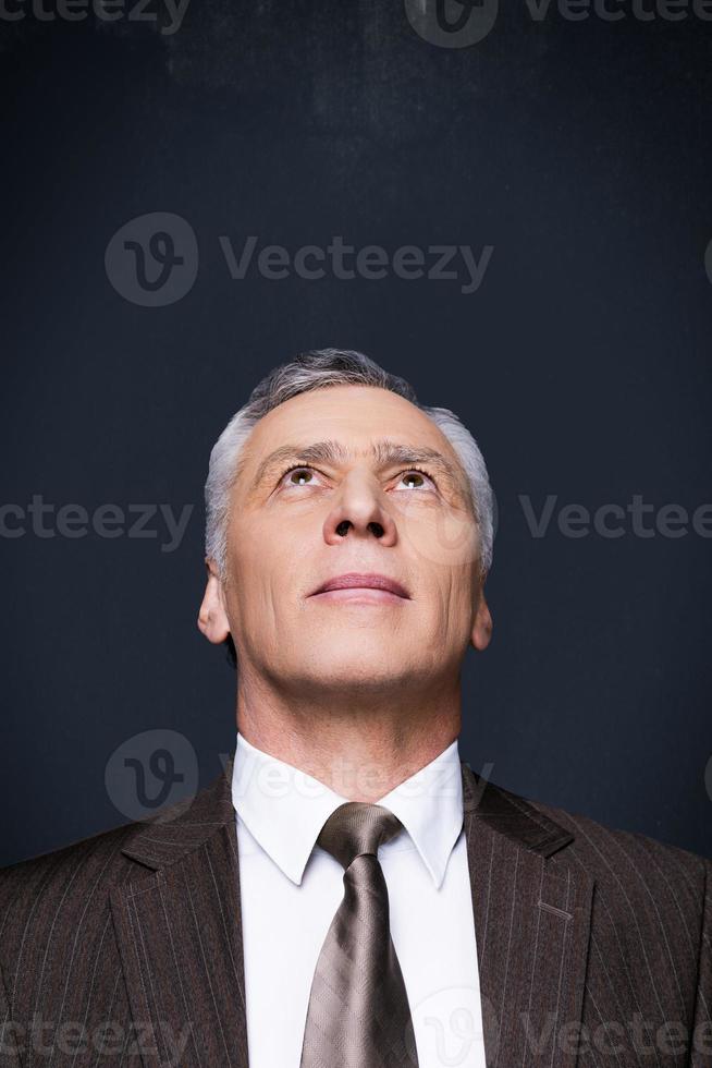 Curious businessman. Portrait of curious senior man in formalwear ... Curious businessman. Portrait of curious senior man in formalwear ...