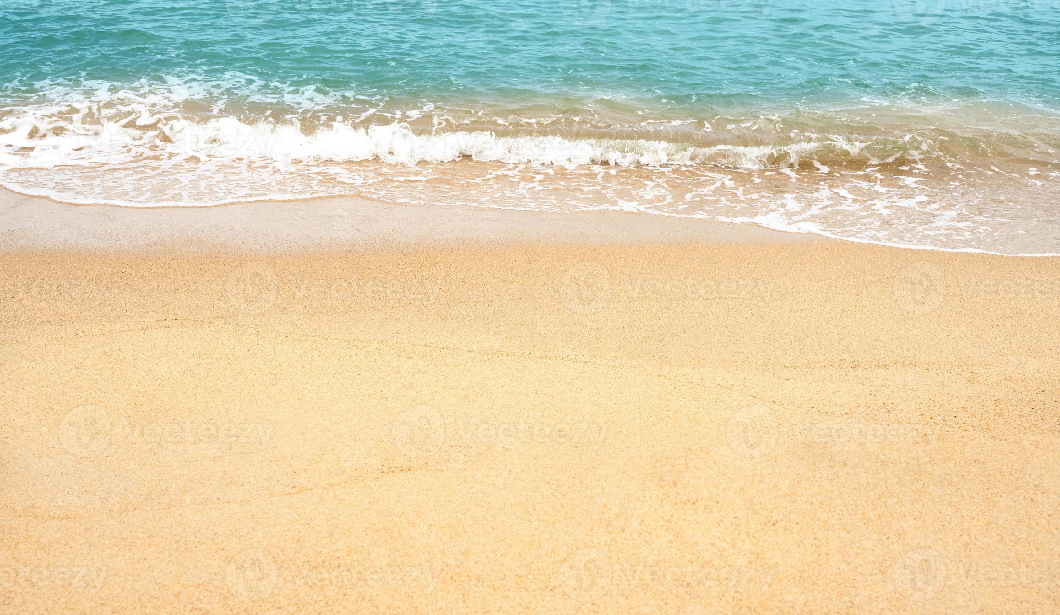 Sand Beach And Blue Ocean With Soft Wave Form On Sand Texture Seaside