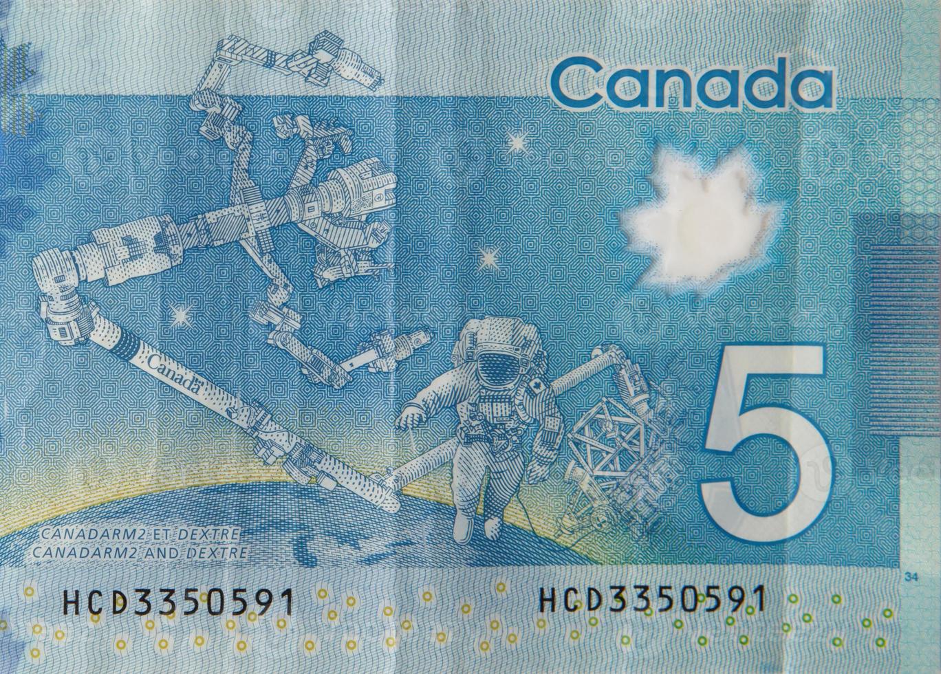 Dextre and canadarm2 on Canada 5 Dollars 2013 Polymer Banknote fragment 13425058 Stock Photo at ...