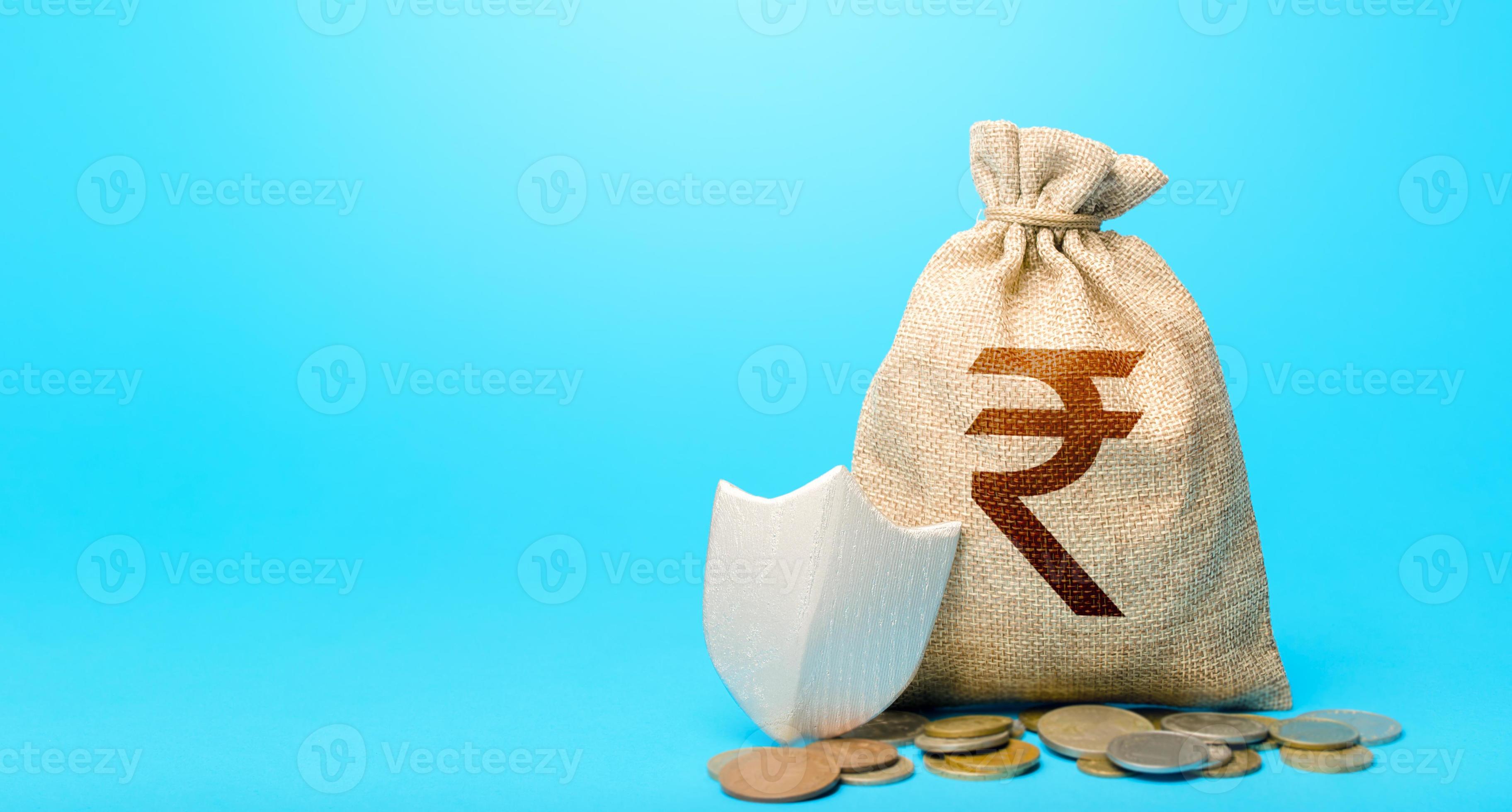 Indian rupee money bag and protection shield. Avoiding loss of funds during inflation. Financial ...