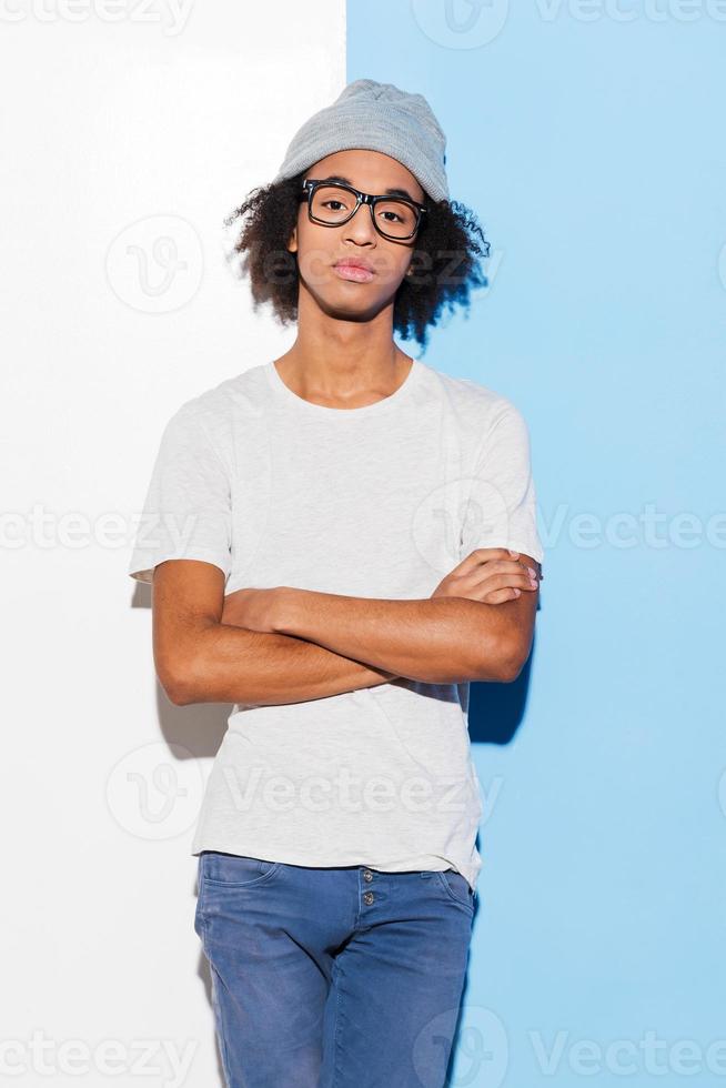 Stylish handsome. Handsome young African teenage boy keeping arms ... Stylish handsome. Handsome young African teenage boy keeping arms ...