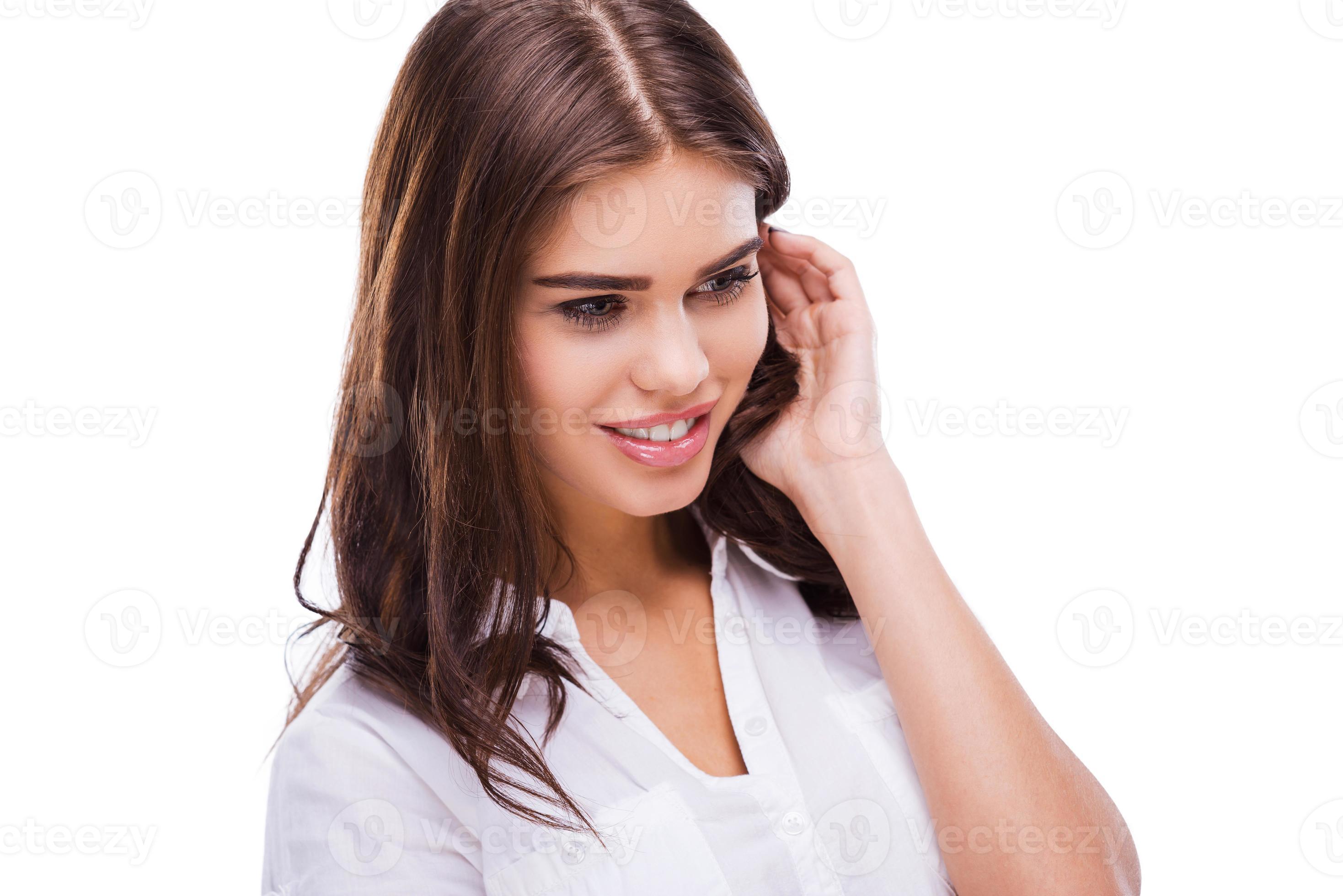 Shy Beauty Attractive Young Woman Holding Hand In Her Hair And Looking