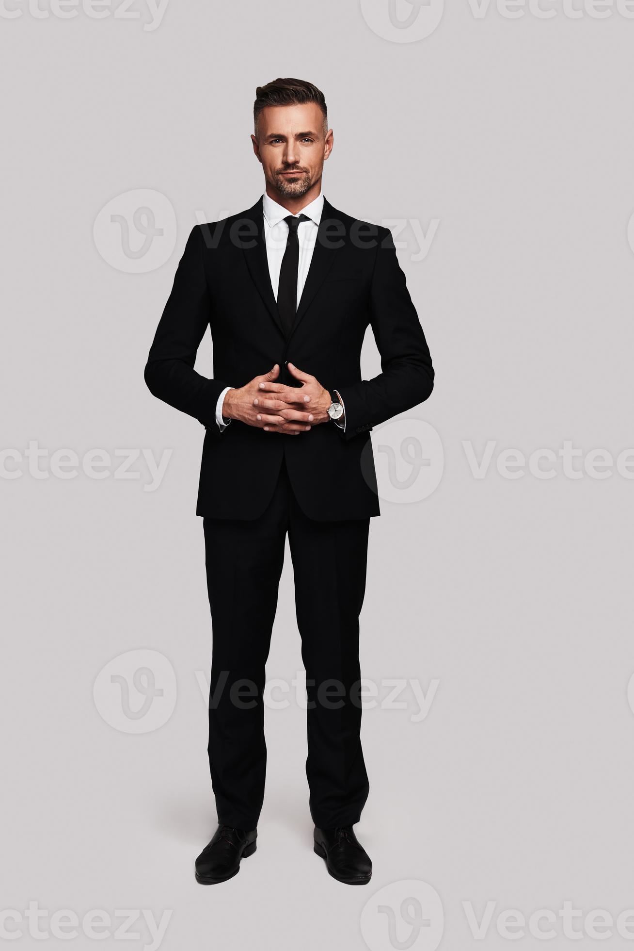 Business professional. Full length of handsome young man in full suit ...
