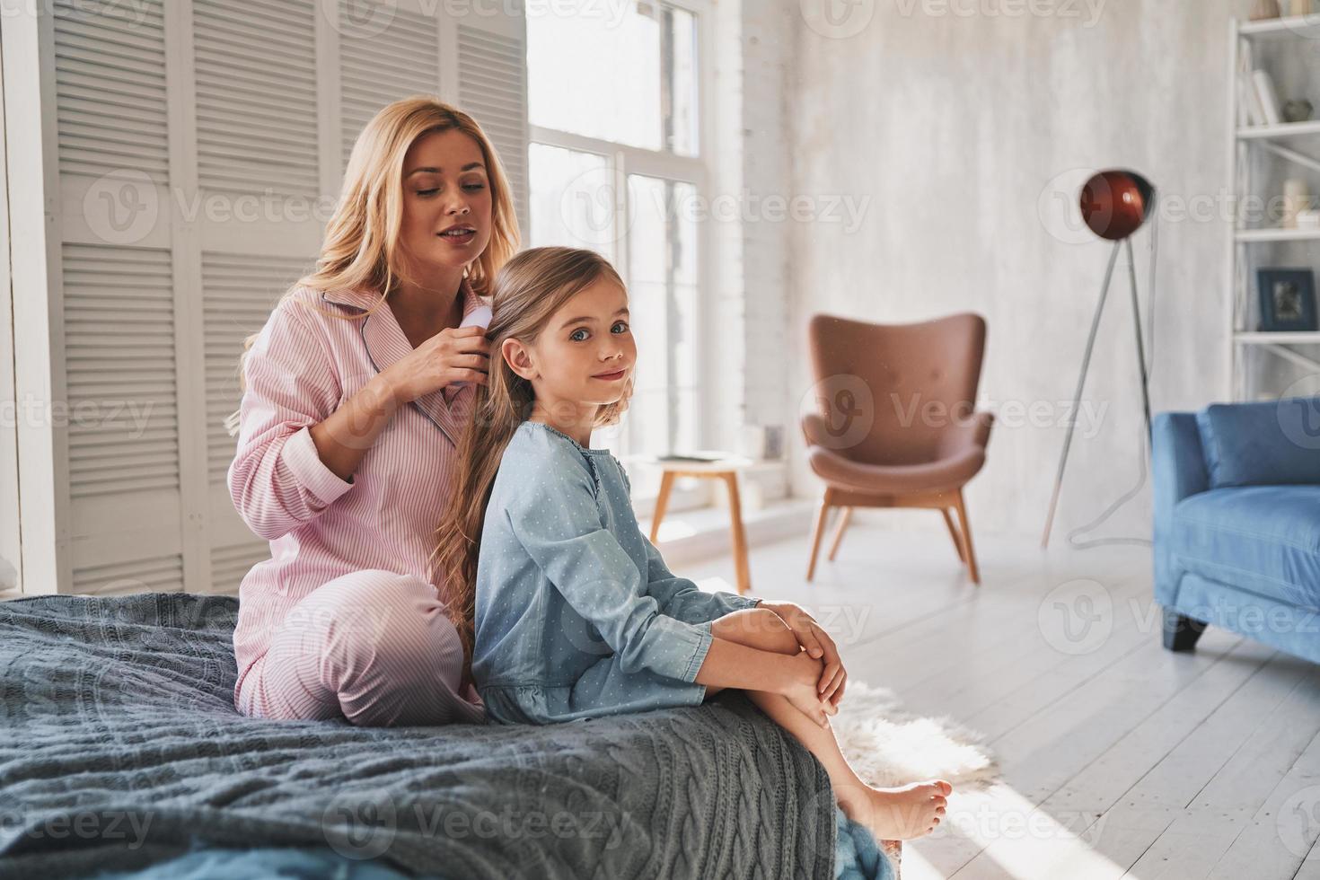 Mother Is The Best Hairdresser Beautiful Young Mother Brushing Her