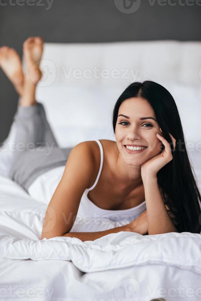 Resting At Home Attractive Young Woman Keeping Hand On Cheek And