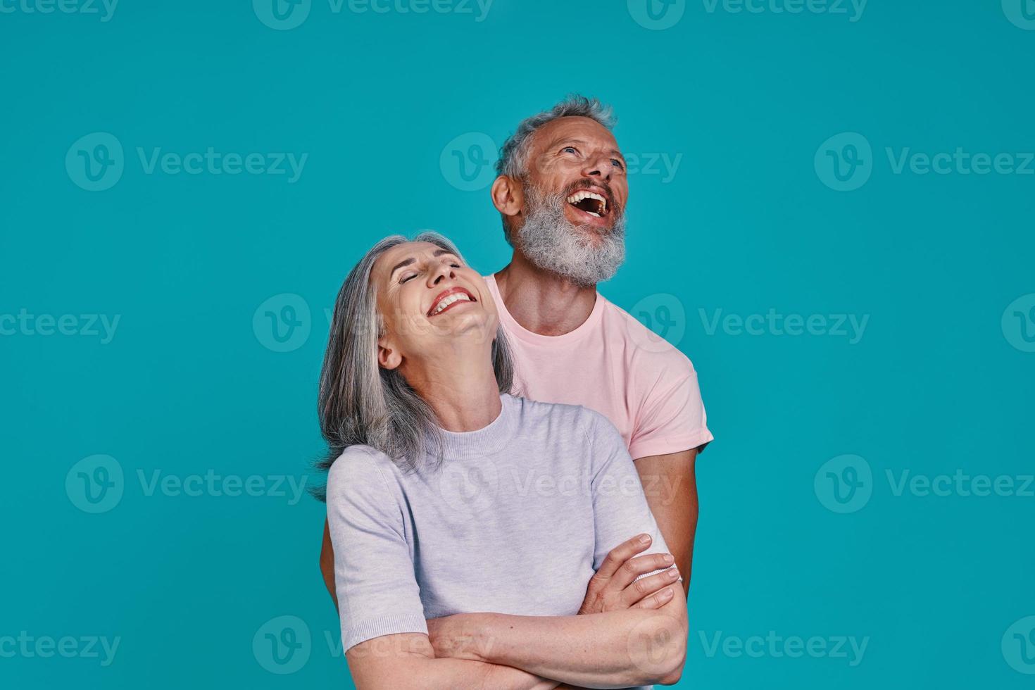 Happy Senior Couple Bonding And Laughing While Standing Together