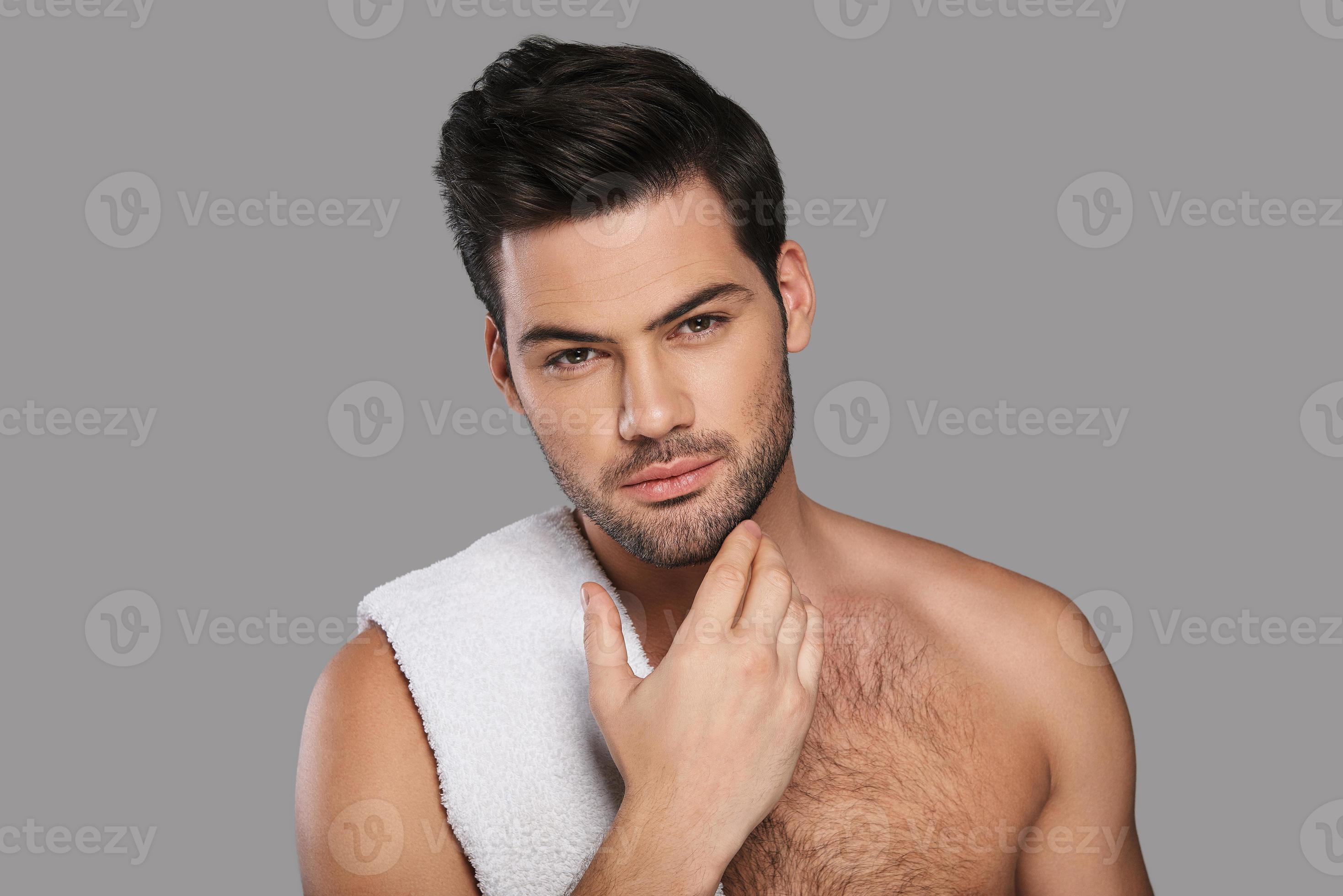 He is looking right into your heart. Handsome young man looking at ...