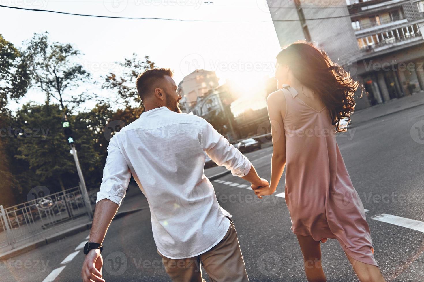Romantic Couple Rear View Of Beautiful Young Couple Holding Hands
