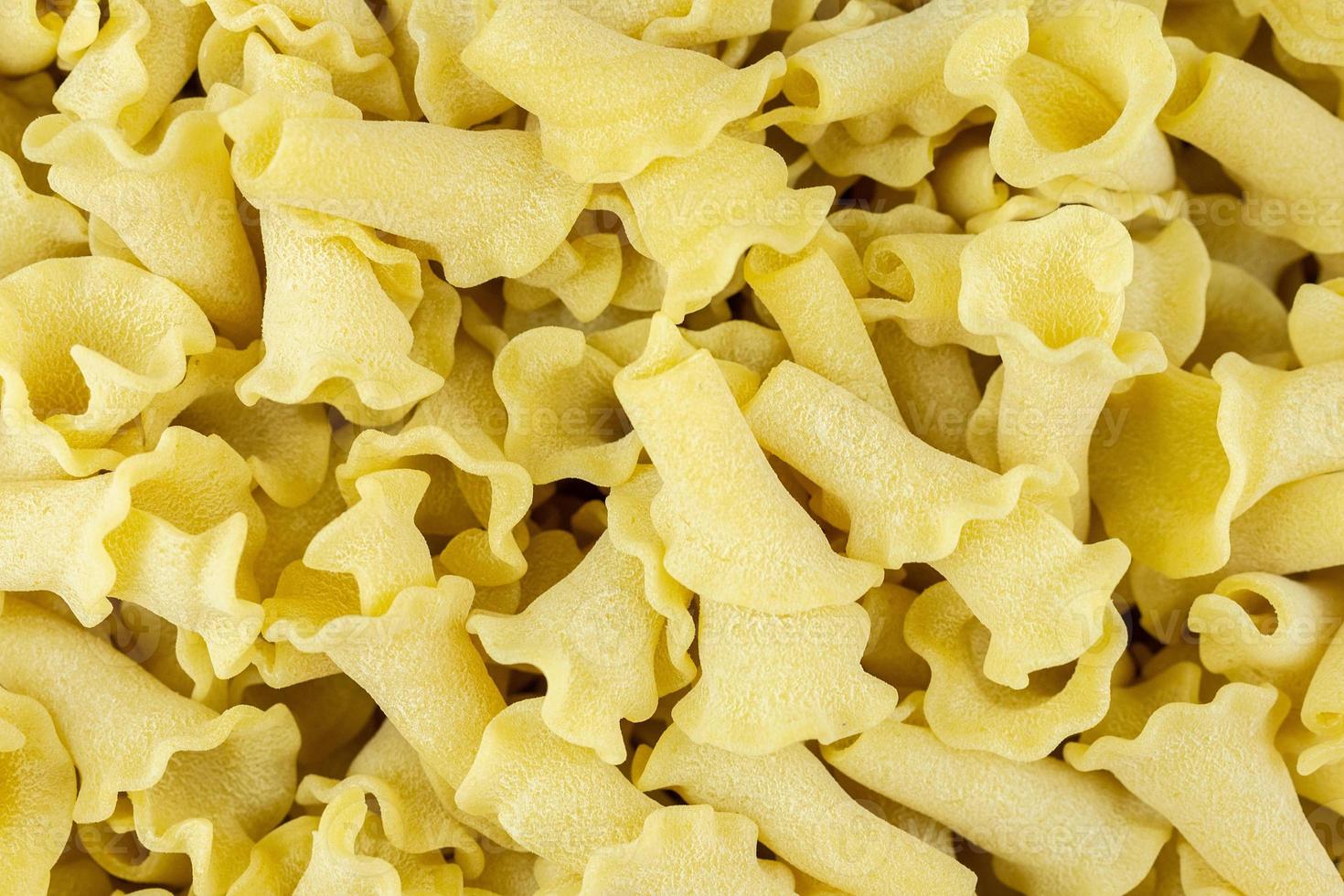 pasta background campanelle 13620066 Stock Photo at Vecteezy