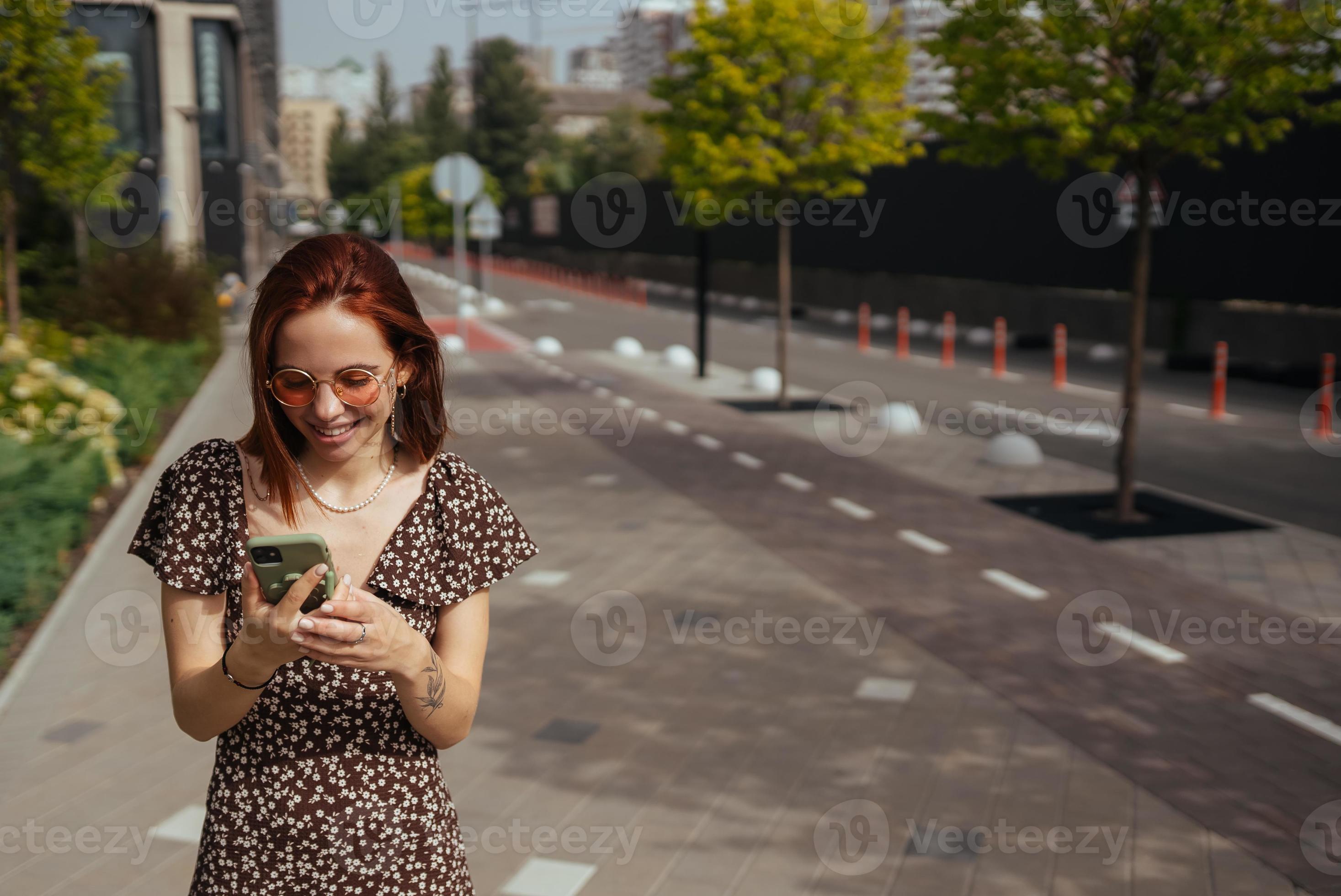 Cute Girl Talking On Mobile Phone On Modern City Background 13632760