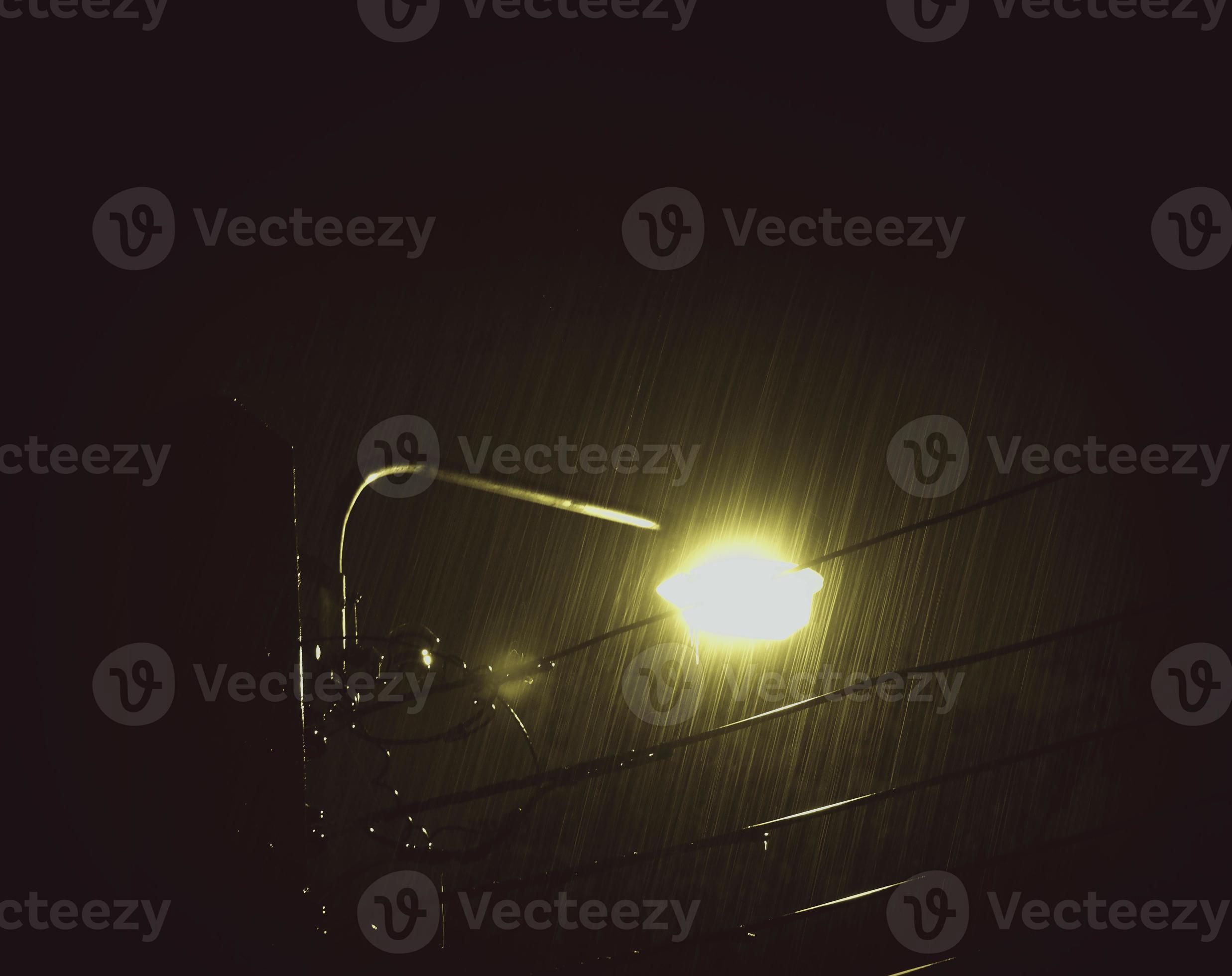 Raining Night and light. Rain Drops Falling in night at Bangkok ... Raining Night and light. Rain Drops Falling in night at Bangkok ...
