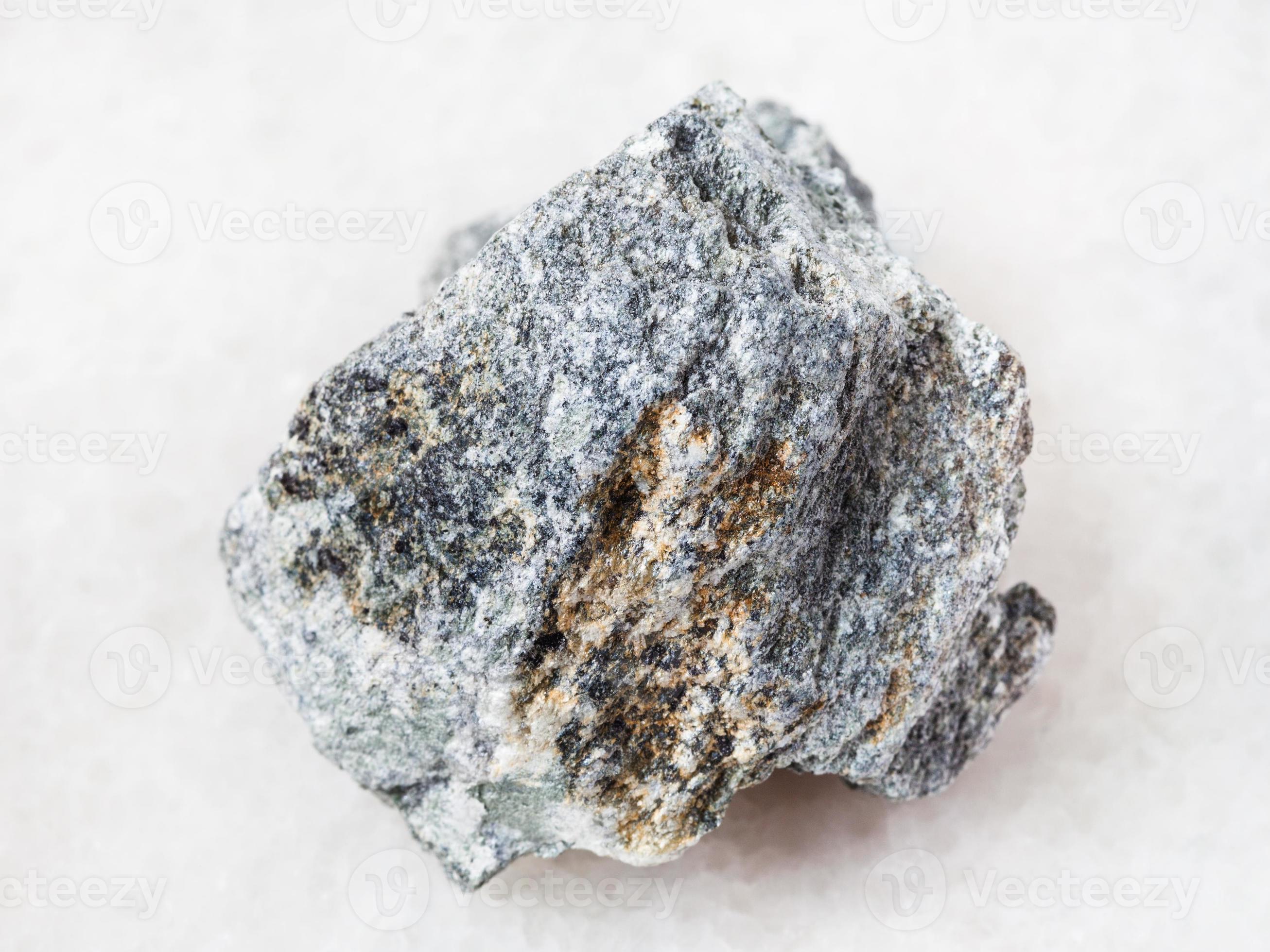 rough Soapstone stone talc - schist on white 13755120 Stock Photo at Vecteezy