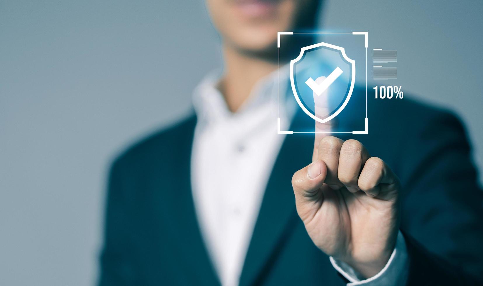 Businessman press shield icon on virtual screen, Data or network ... Businessman press shield icon on virtual screen, Data or network ...