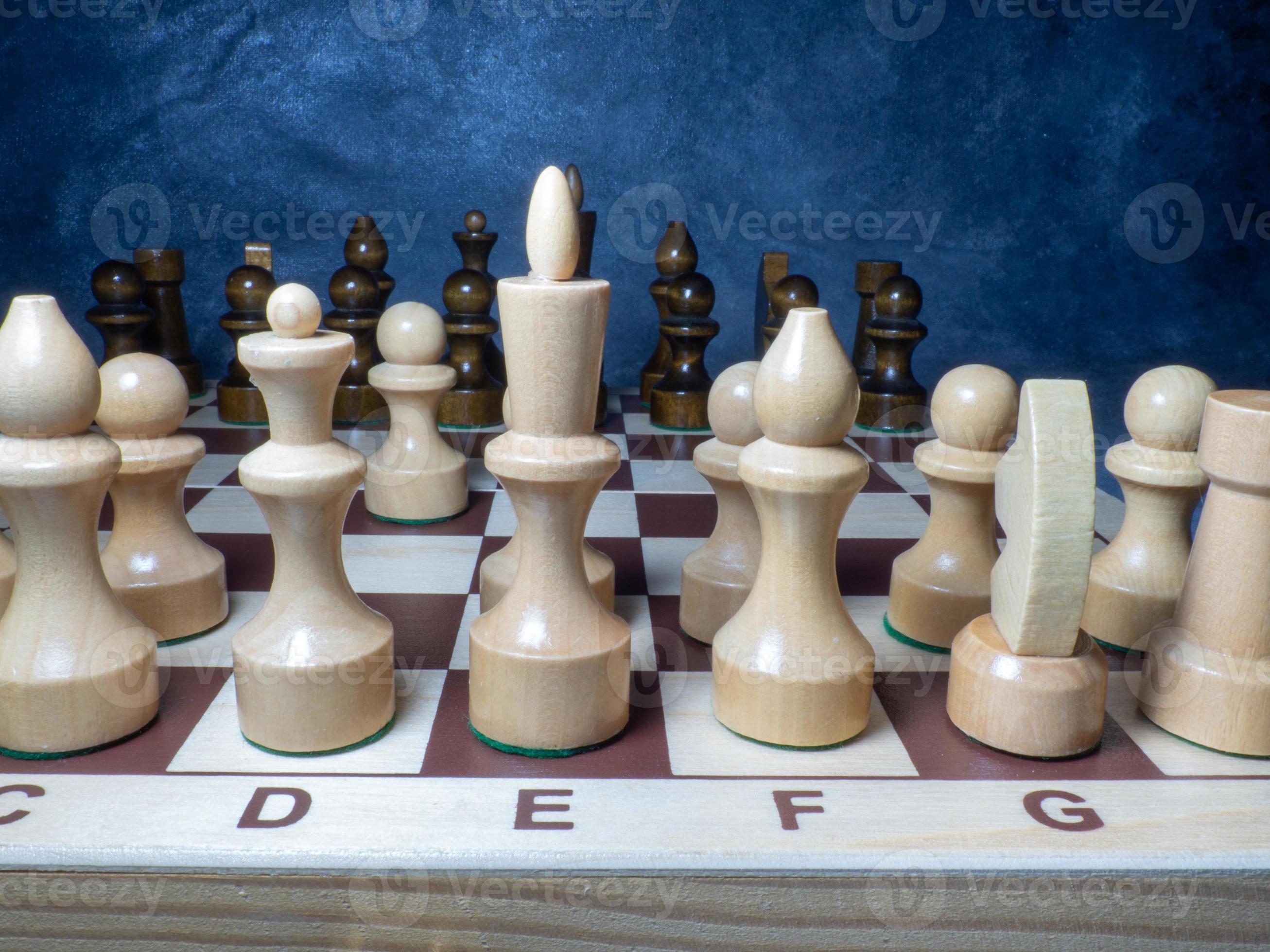 Chess board with figures. Wooden chess. Board games. Location of ...