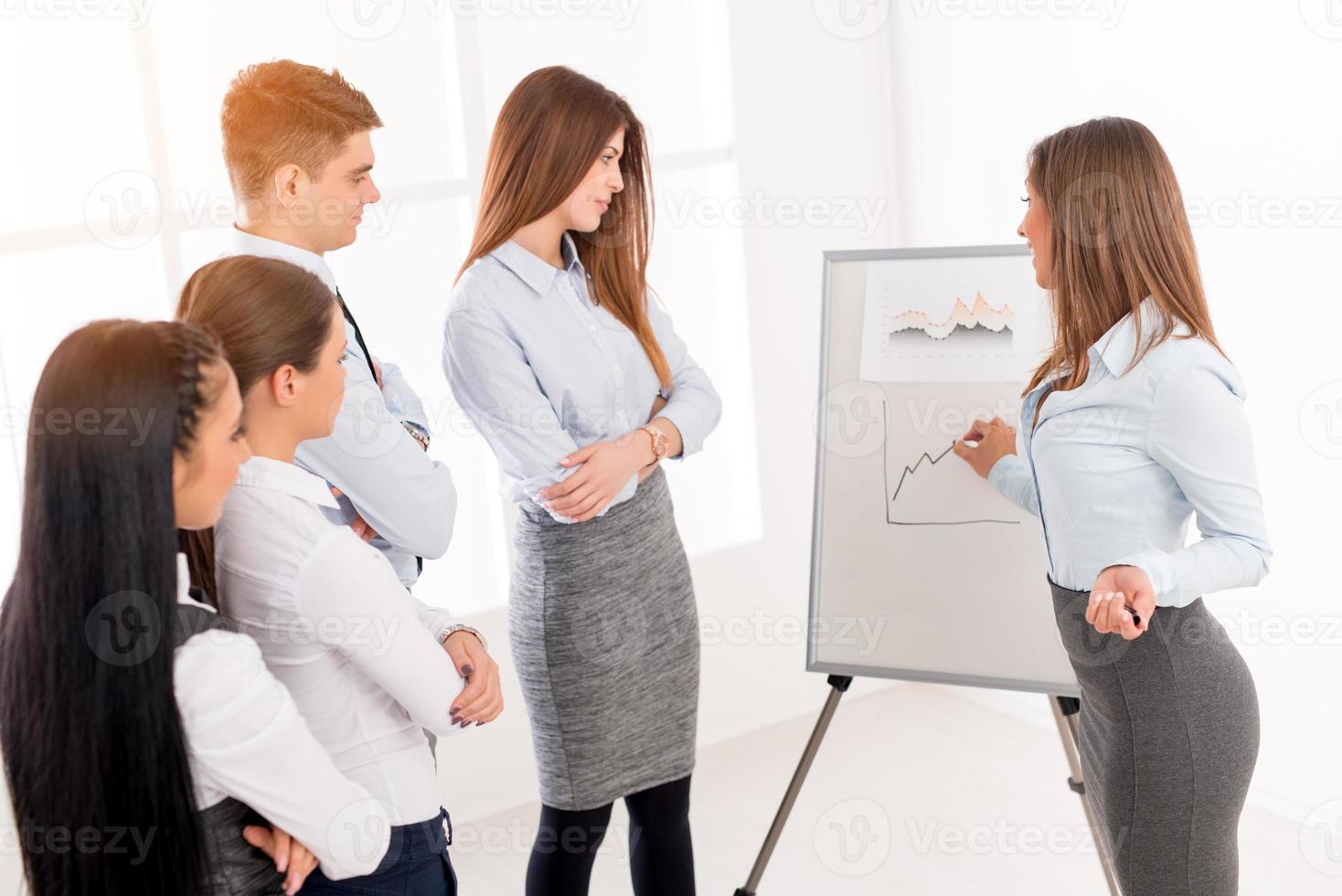 Businesswoman Pointing Flip Chart 14069958 Stock Photo at Vecteezy Businesswoman Pointing Flip Chart 14069958 Stock Photo at Vecteezy