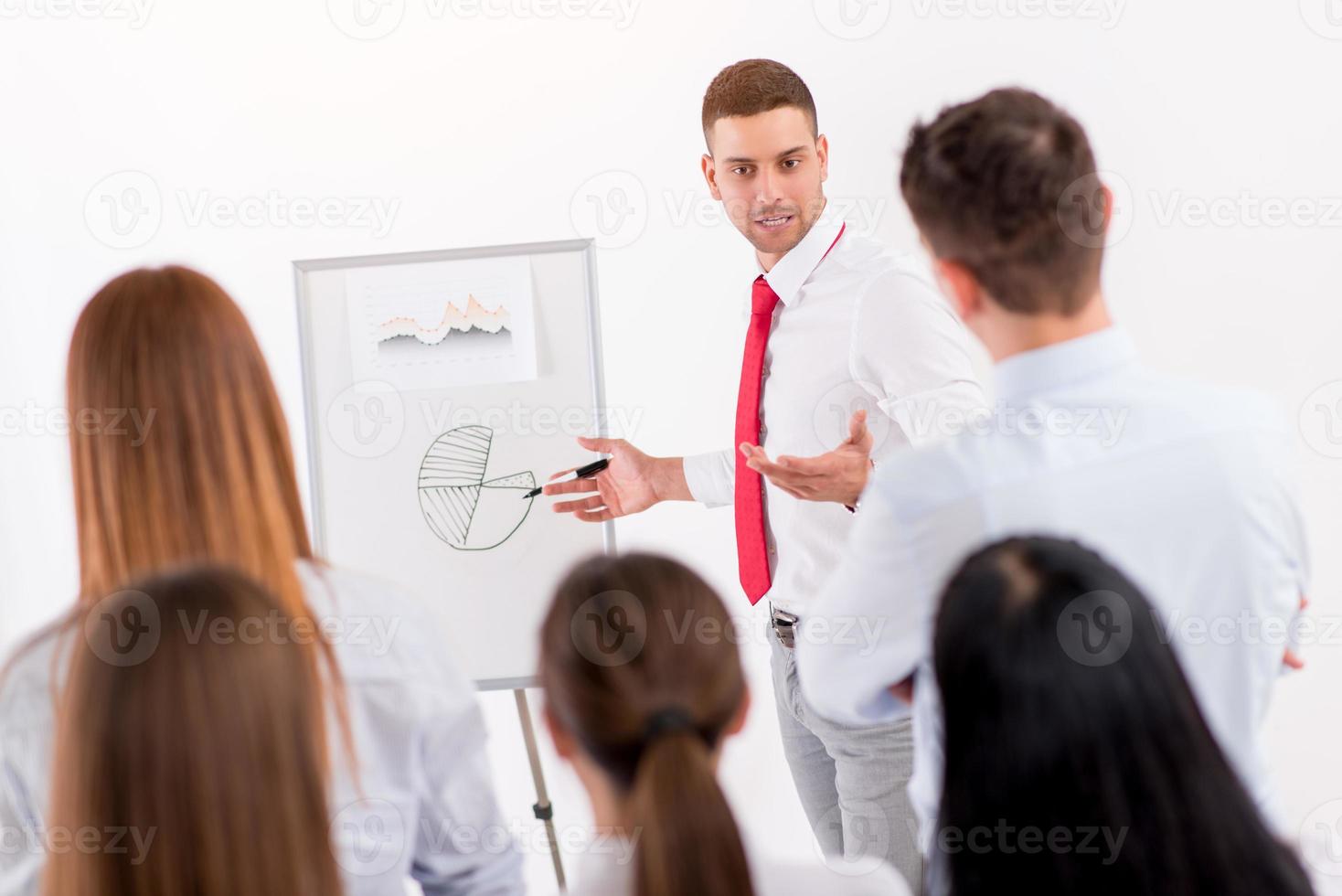 Businessman Pointing Flip Chart 14069965 Stock Photo at Vecteezy Businessman Pointing Flip Chart 14069965 Stock Photo at Vecteezy