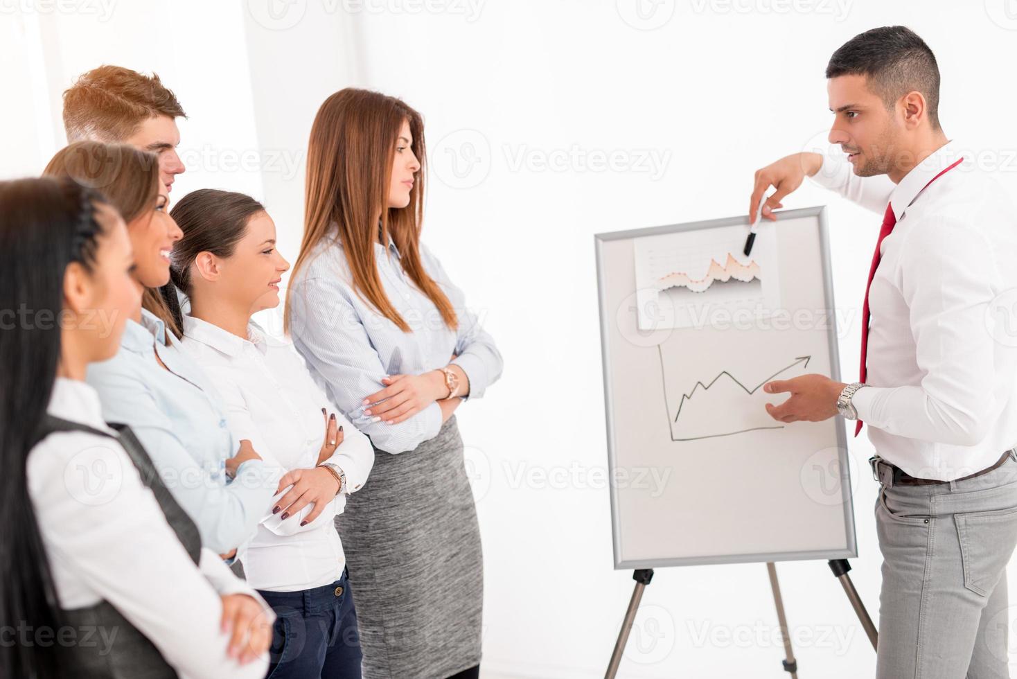 Businessman Pointing Flip Chart 14072198 Stock Photo at Vecteezy Businessman Pointing Flip Chart 14072198 Stock Photo at Vecteezy