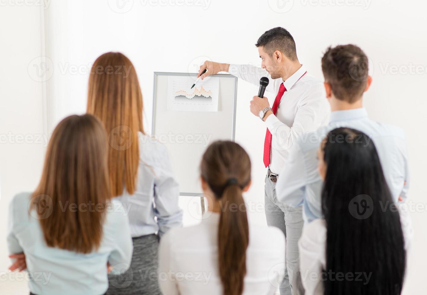 Businessman Pointing Flip Chart 14162142 Stock Photo at Vecteezy Businessman Pointing Flip Chart 14162142 Stock Photo at Vecteezy