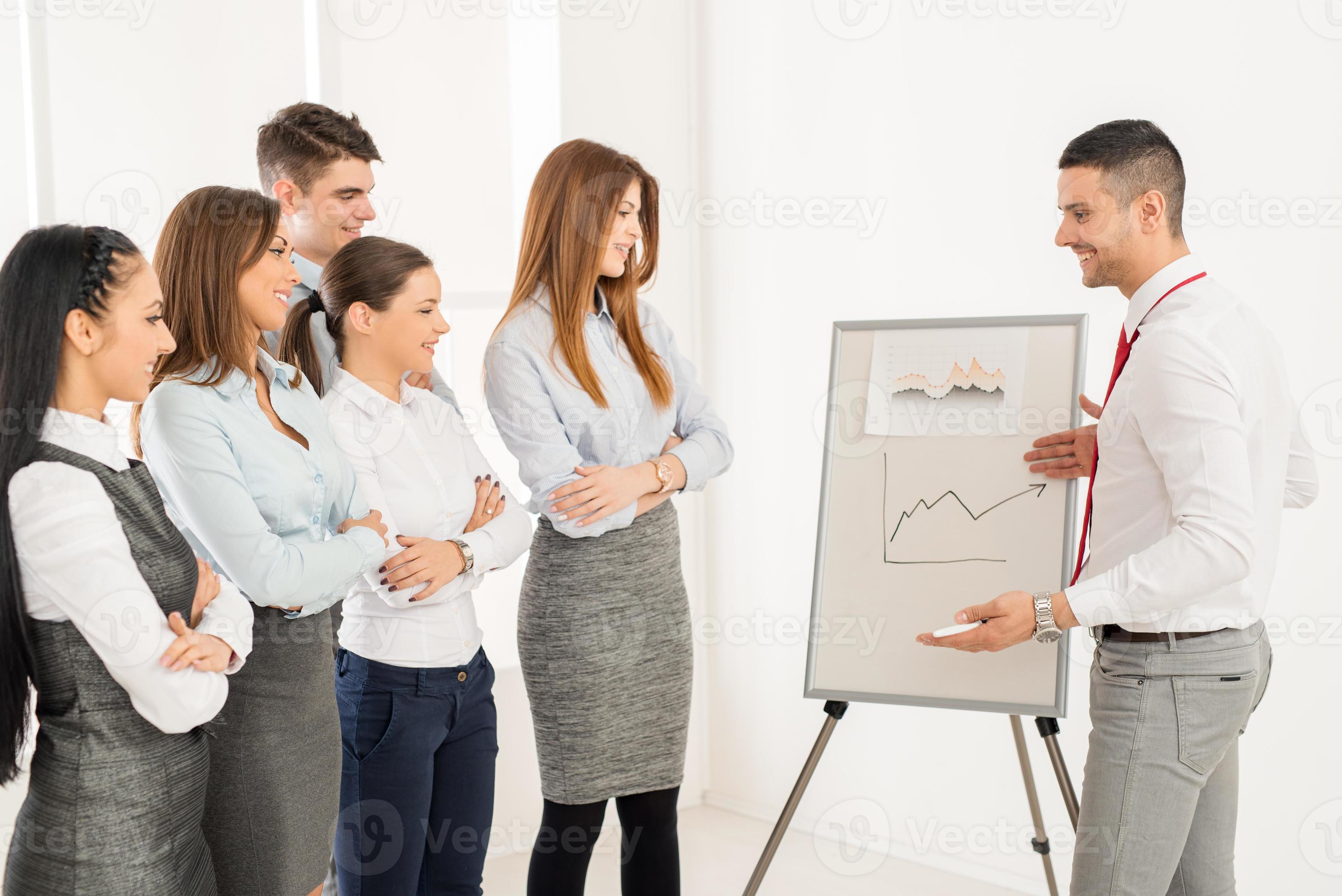 Businessman Pointing Flip Chart 14162303 Stock Photo at Vecteezy Businessman Pointing Flip Chart 14162303 Stock Photo at Vecteezy