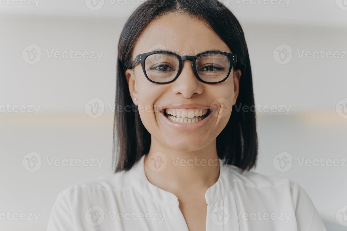 Smiling Businesswoman Wearing Glasses Looking At Camera Advertising