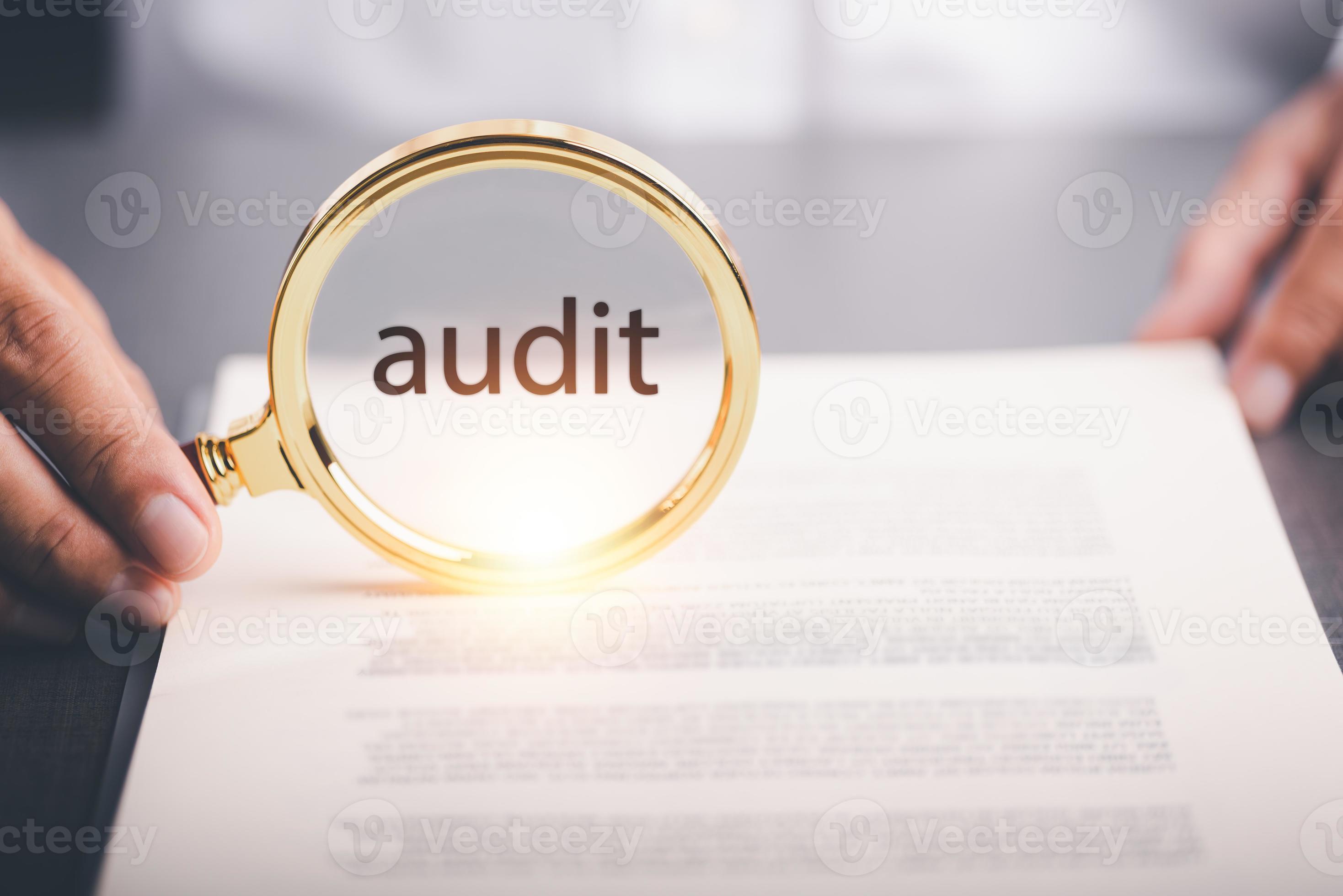 Businessman Audit documents with a magnifying glass, Quality Assessment ...