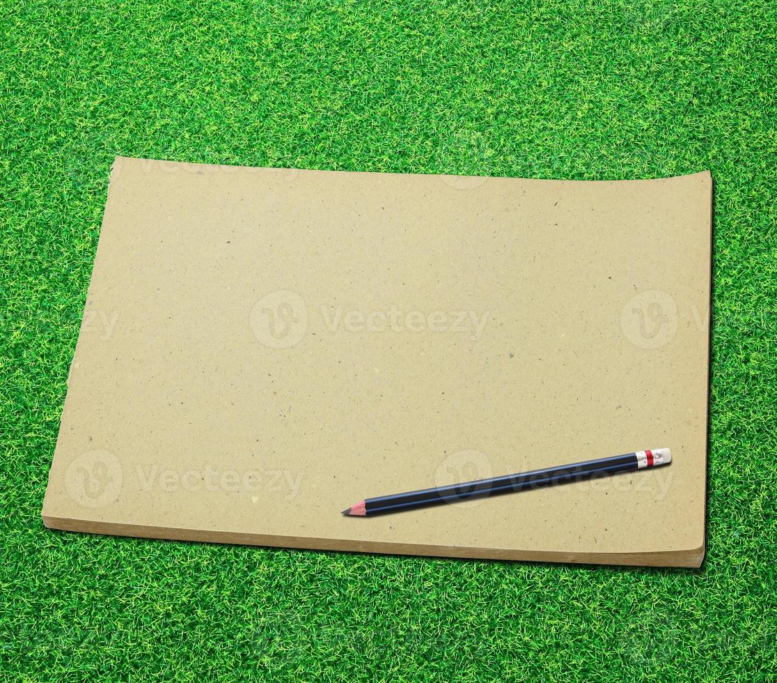 Pencil and old blank sketch book on green grass background 14260286 ... Pencil and old blank sketch book on green grass background 14260286 ...