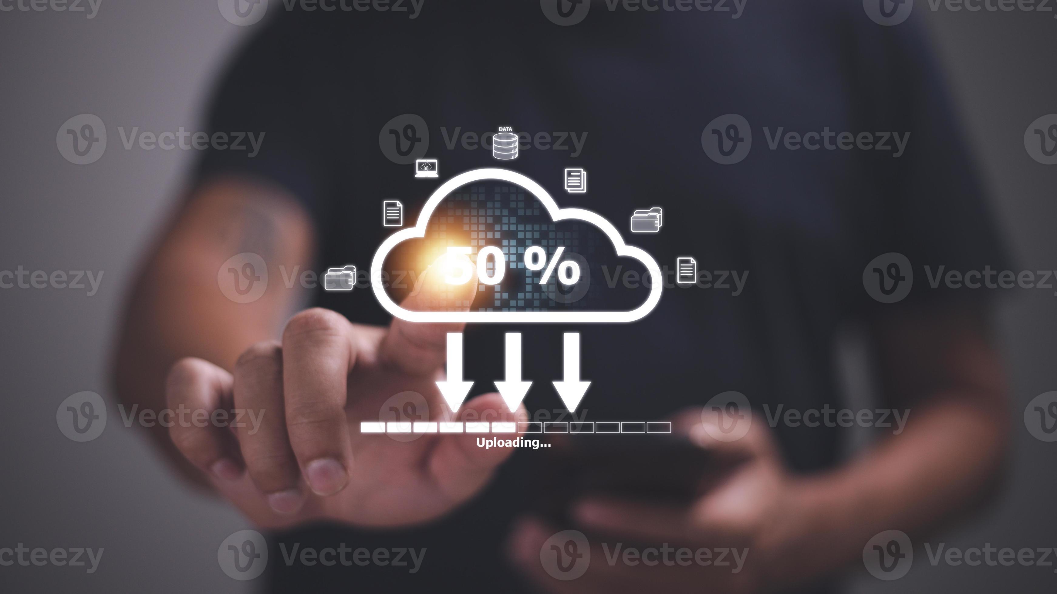 Cloud storage technology concept. Businessmen use laptops to synchronize documents or data to ...