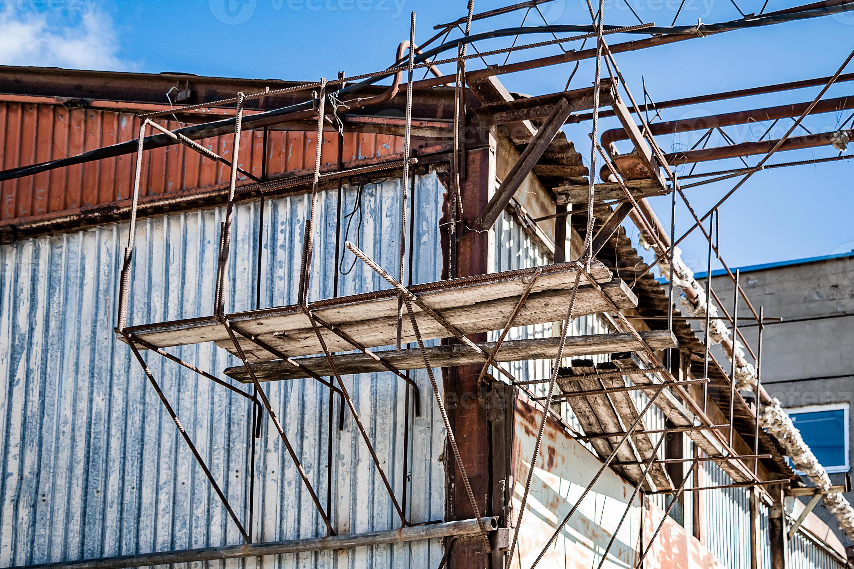 Old destroyed construction site. Rusty scaffolding and construction equipment. 14326933 Stock ...