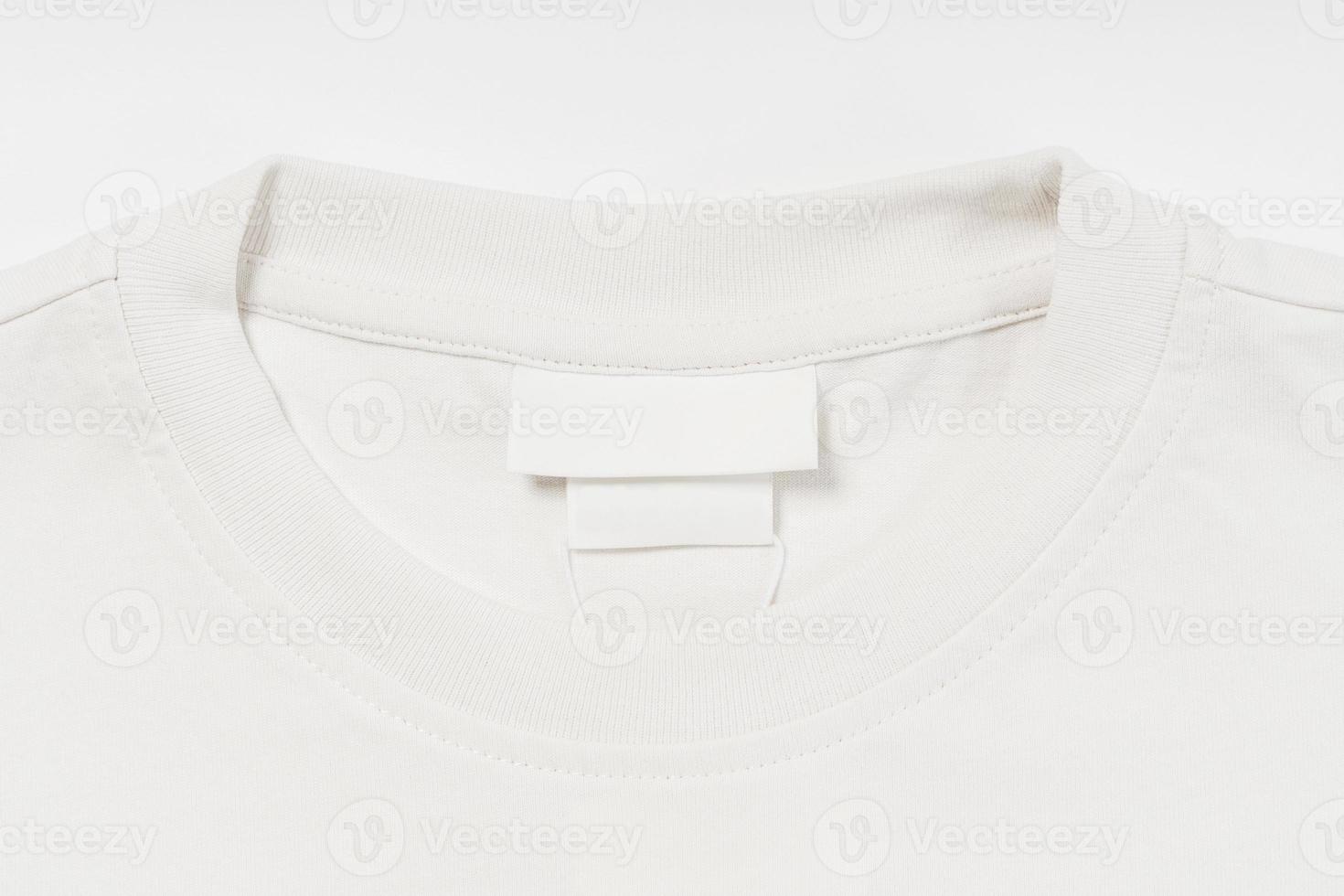 Cotton white t-shirt and hem tags 14403541 Stock Photo at Vecteezy Cotton white t-shirt and hem tags 14403541 Stock Photo at Vecteezy
