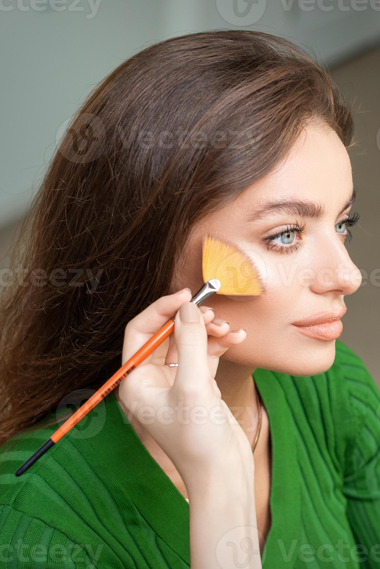 Make Up Artist Applying Professional Make Up Of Tonal Foundation