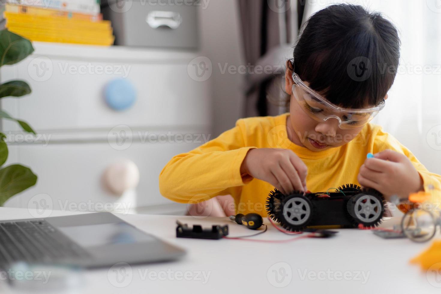 Asia students learn at home in coding robot cars and electronic board ...