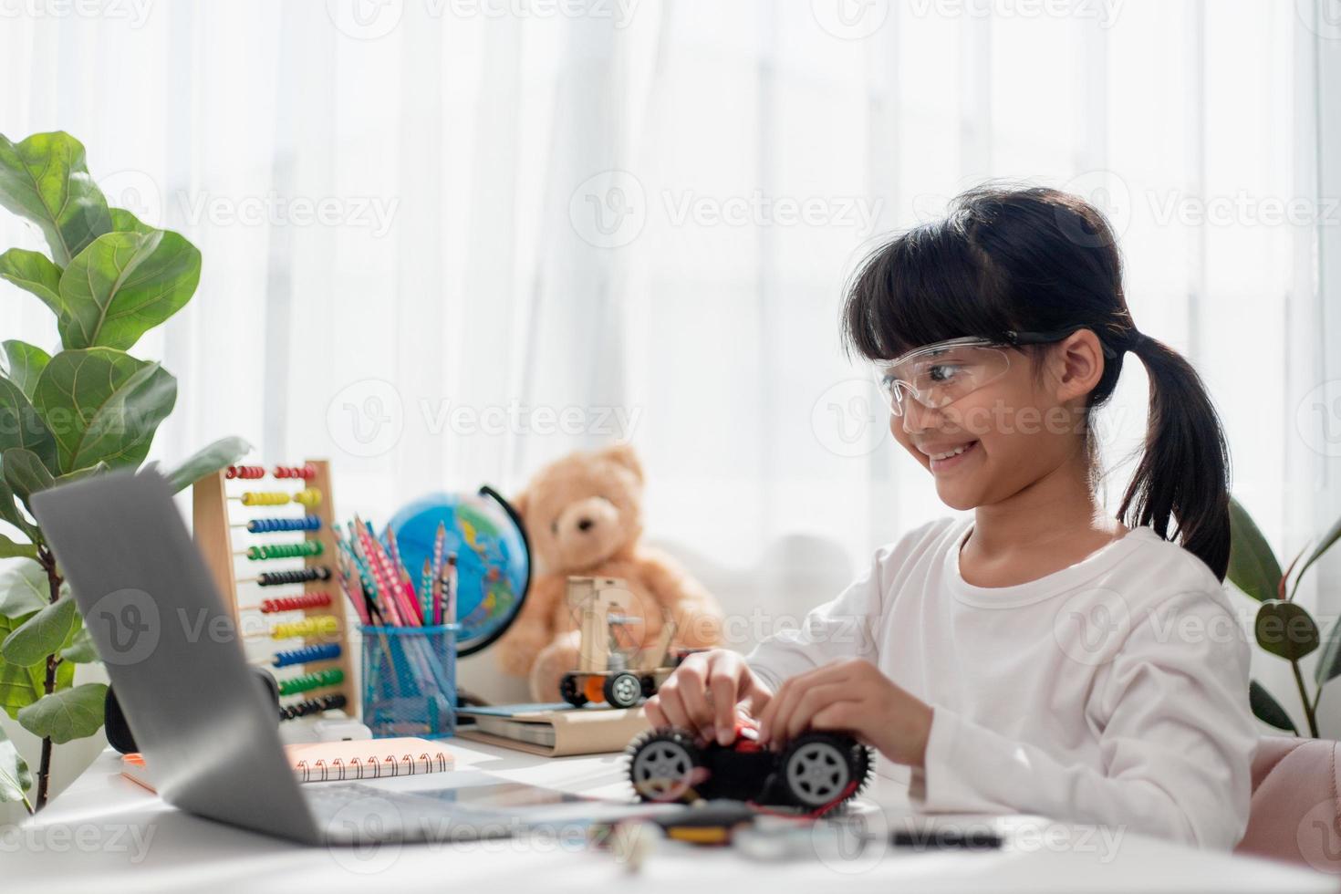 Asia students learn at home in coding robot cars and electronic board ...
