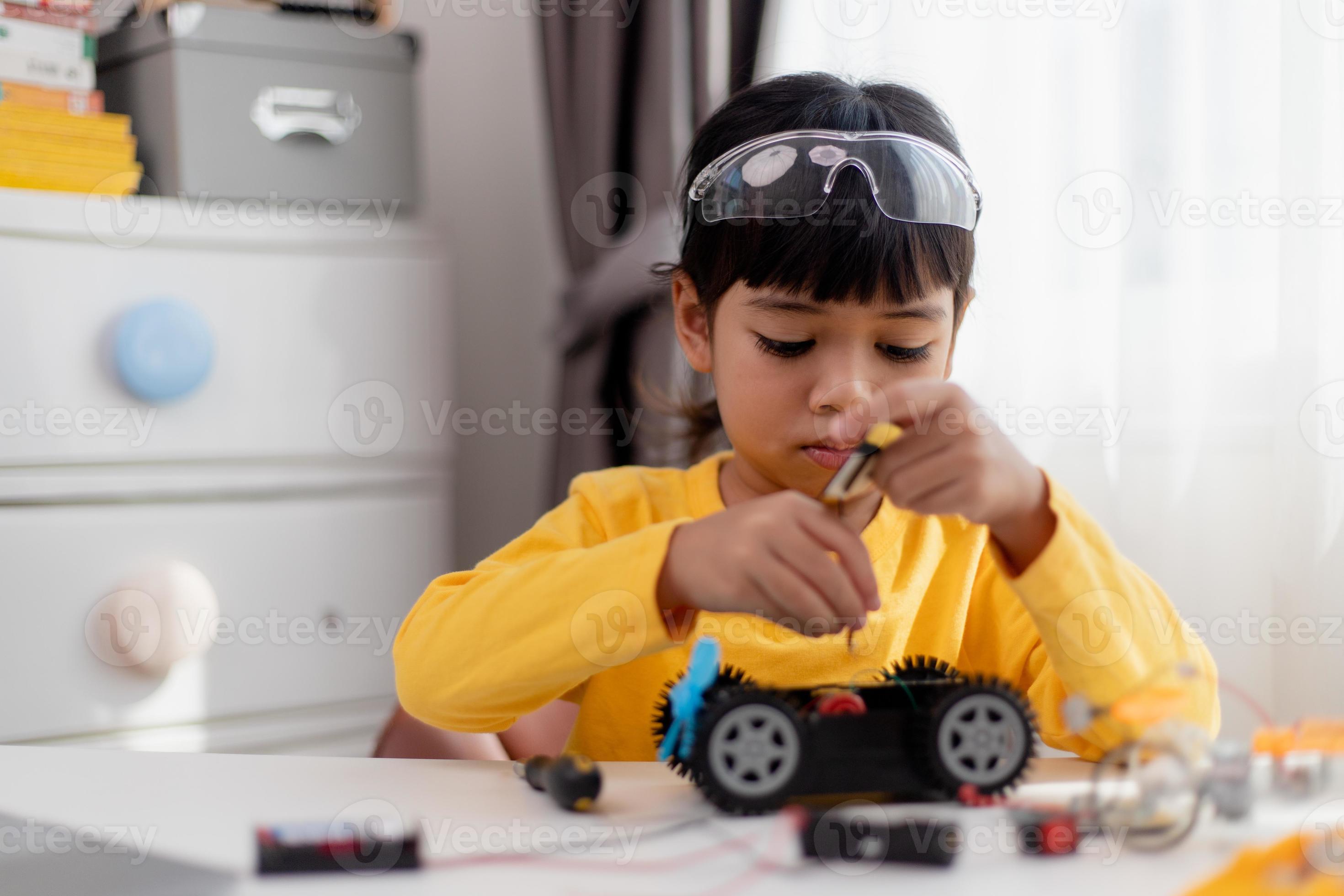 Asia students learn at home in coding robot cars and electronic board ...