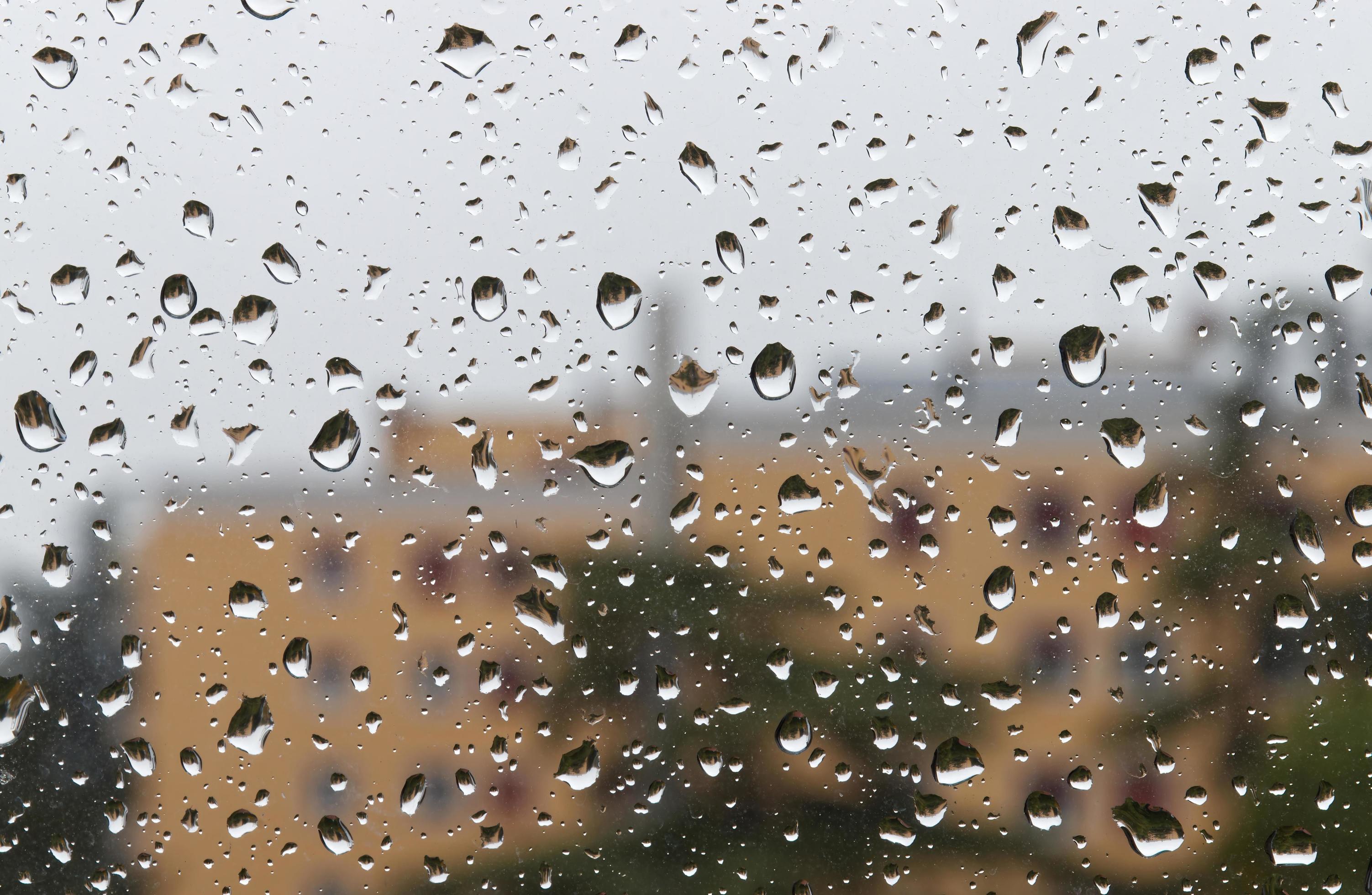Water Droplets condensed on transparent window. Water rain drops. 14909441 Stock Photo at Vecteezy