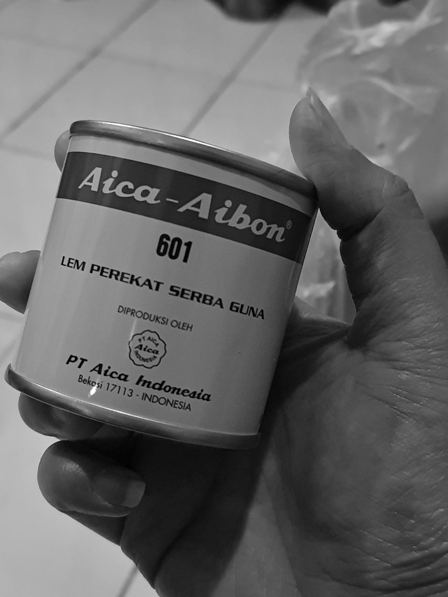 Central Java, Indonesia in October 2022. A hand holding Aica Aibon glue. 14918586 Stock Photo at ...