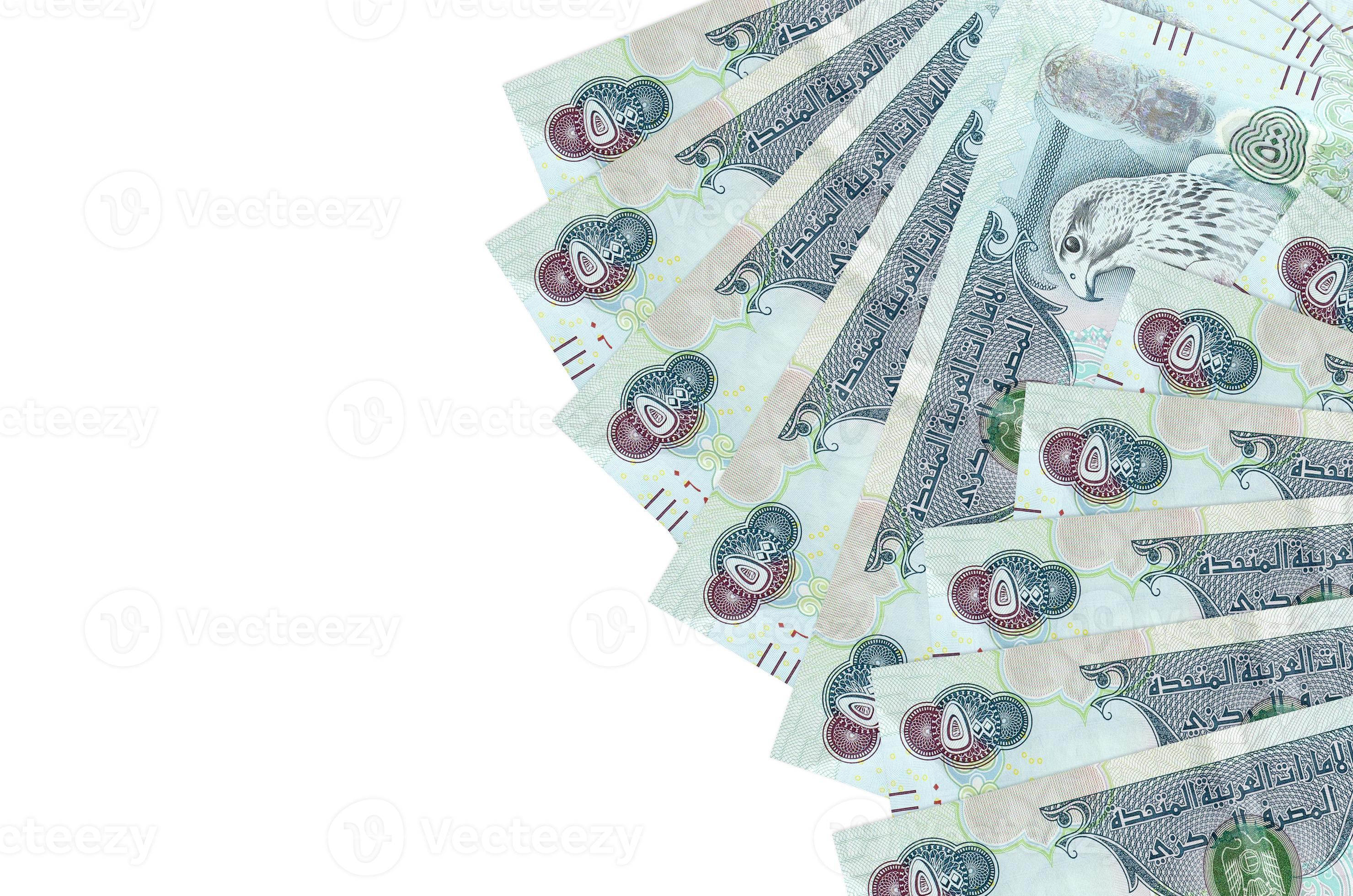 500 UAE dirhams bills lies isolated on white background with copy space. Rich life conceptual ...