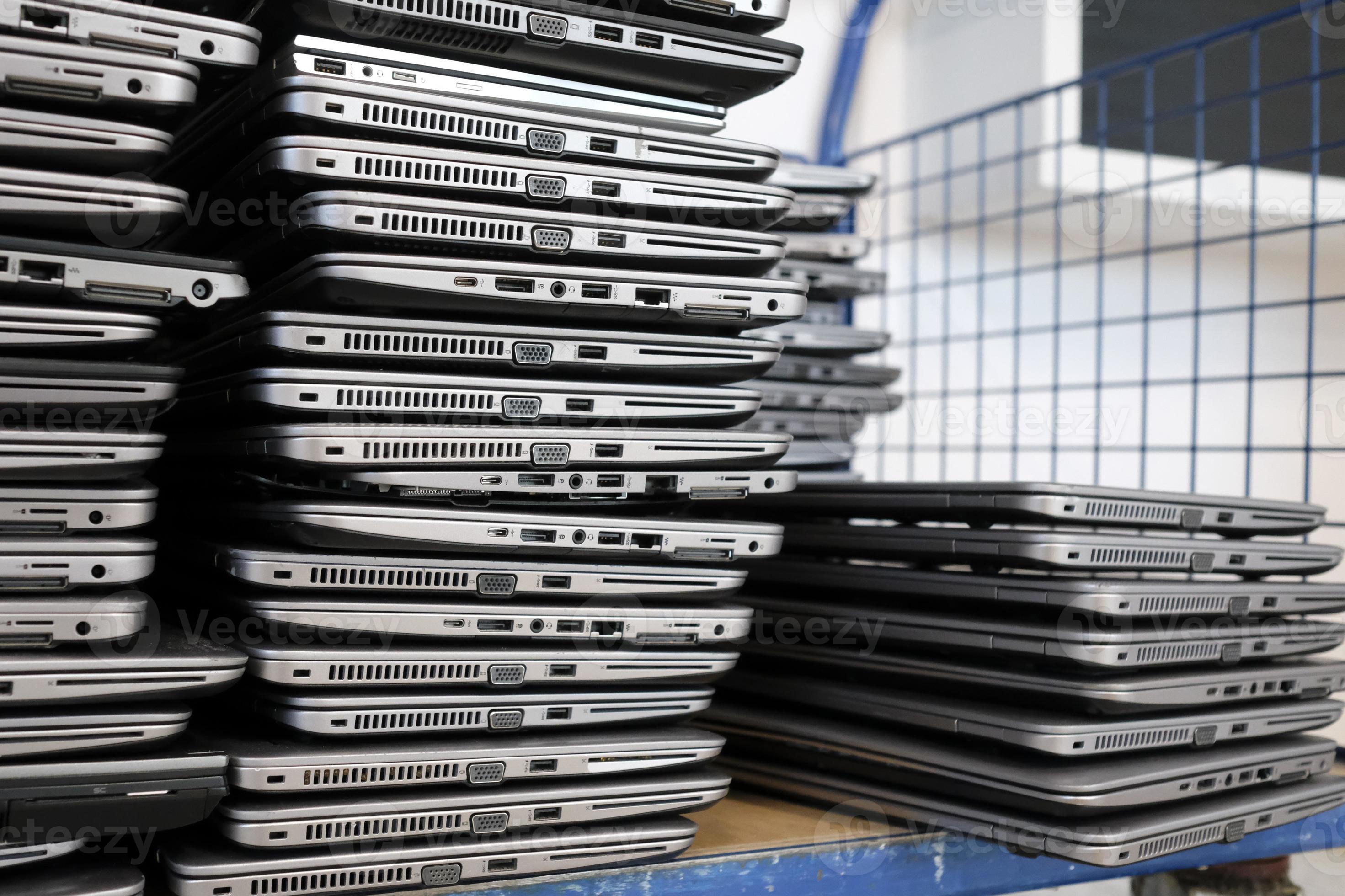 Big stacks of discarded laptops, notebooks on a trolley 14942742 Stock ...