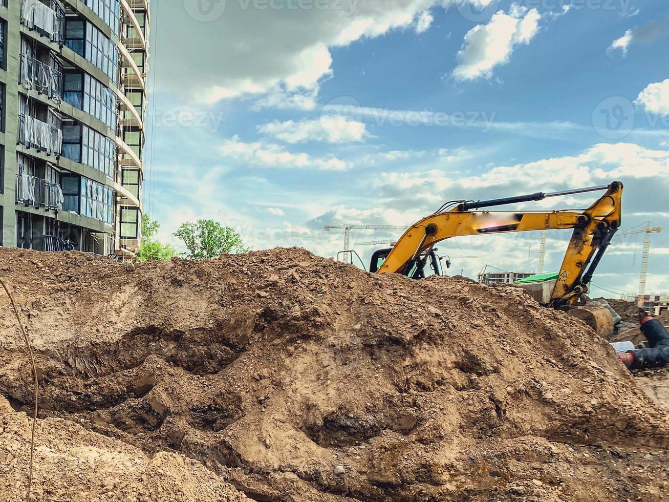 digging a ditch at a construction site. construction of a new ... digging a ditch at a construction site. construction of a new ...