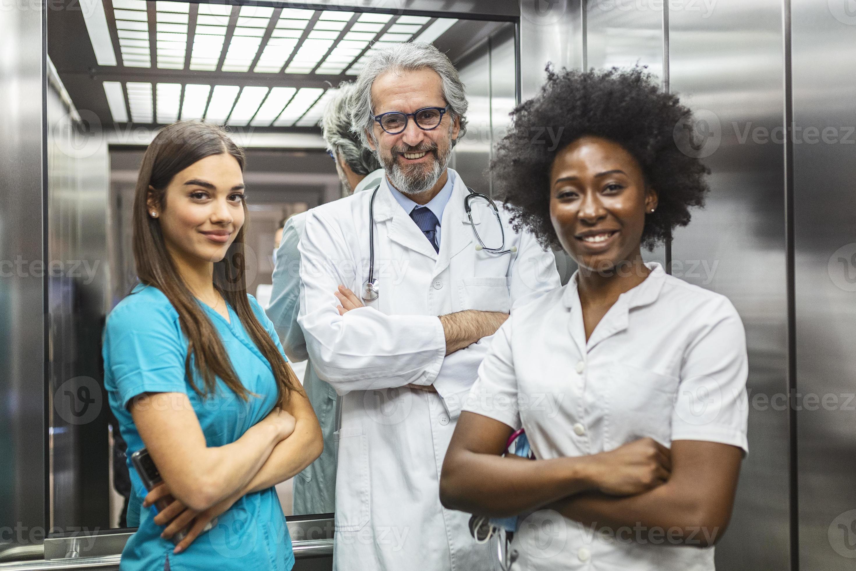 Medical staff people group. Team of doctor and nurse in hospital elevator. Healthcare and ...