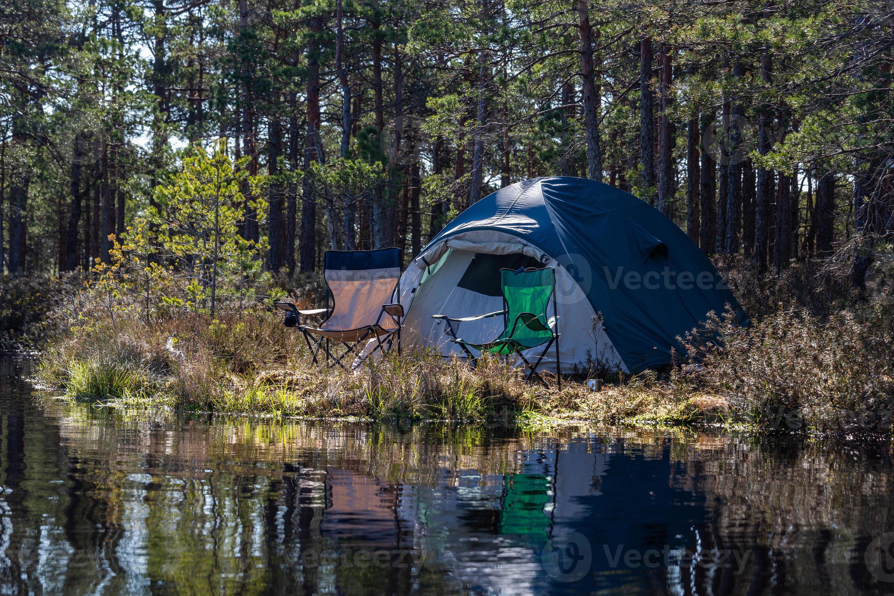 Camping and Tenting by the Lake 15185492 Stock Photo at Vecteezy
