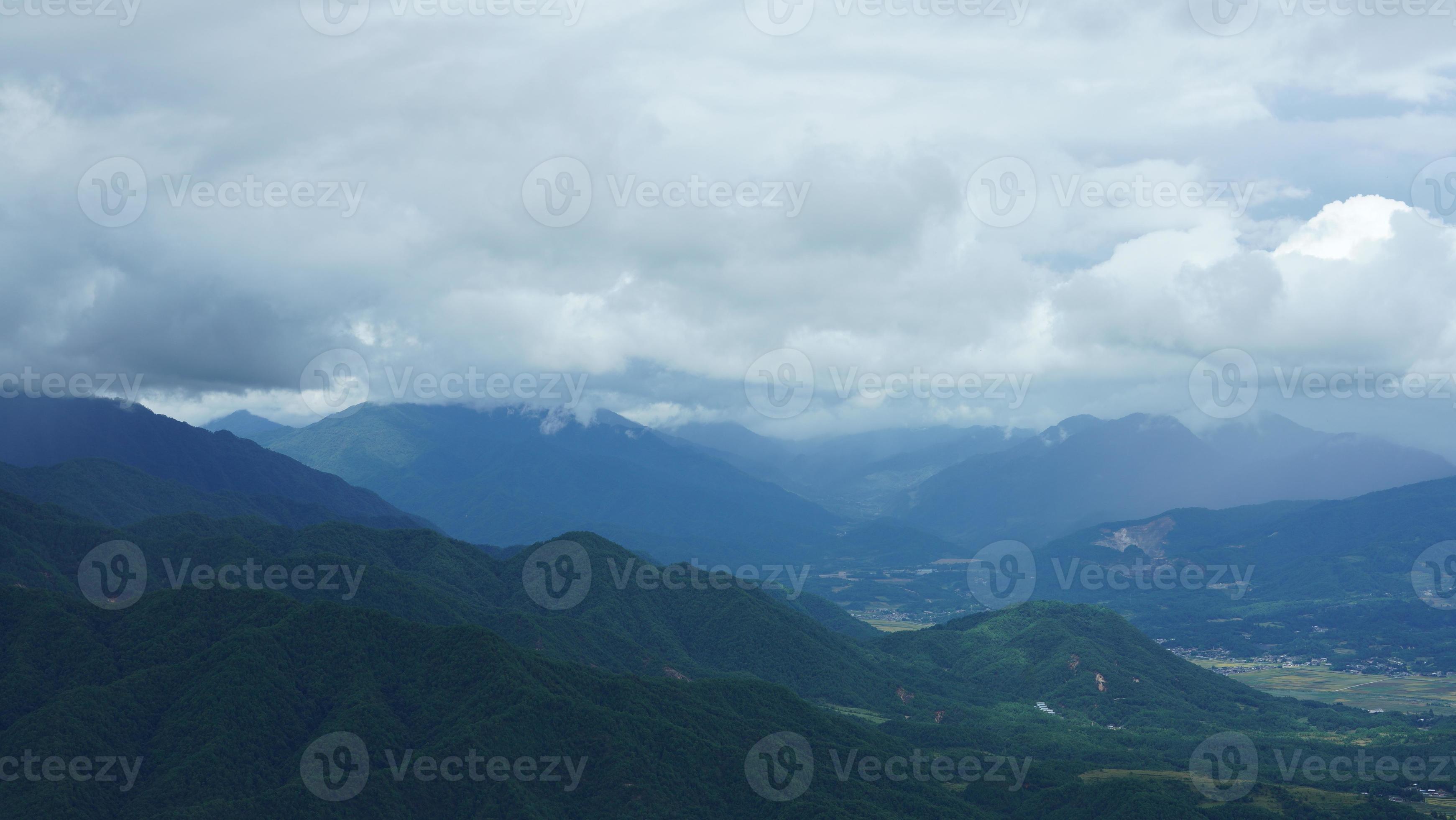 The beautiful mountains view with the cloudy sky and valley among them 15189090 Stock Photo at ...