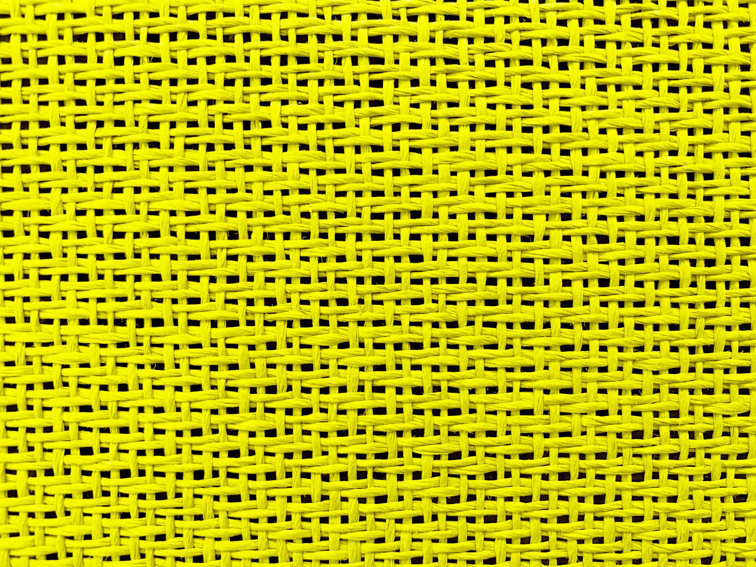 Close up yellow The is woven into a net. natura rope texture as a ...