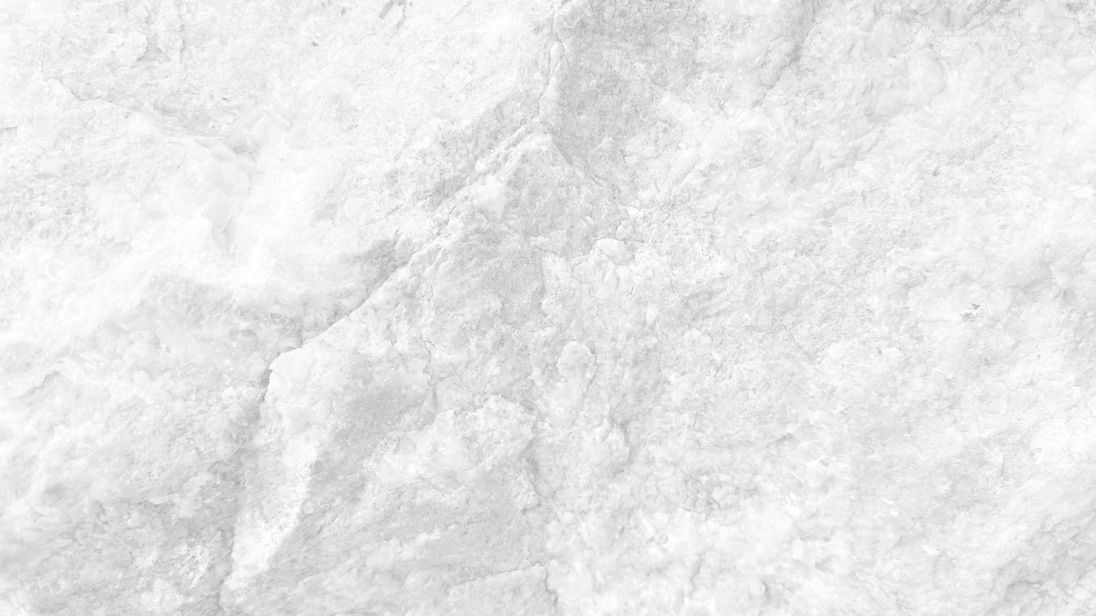 pure white stones on a white background has a rough surface The skin is ...