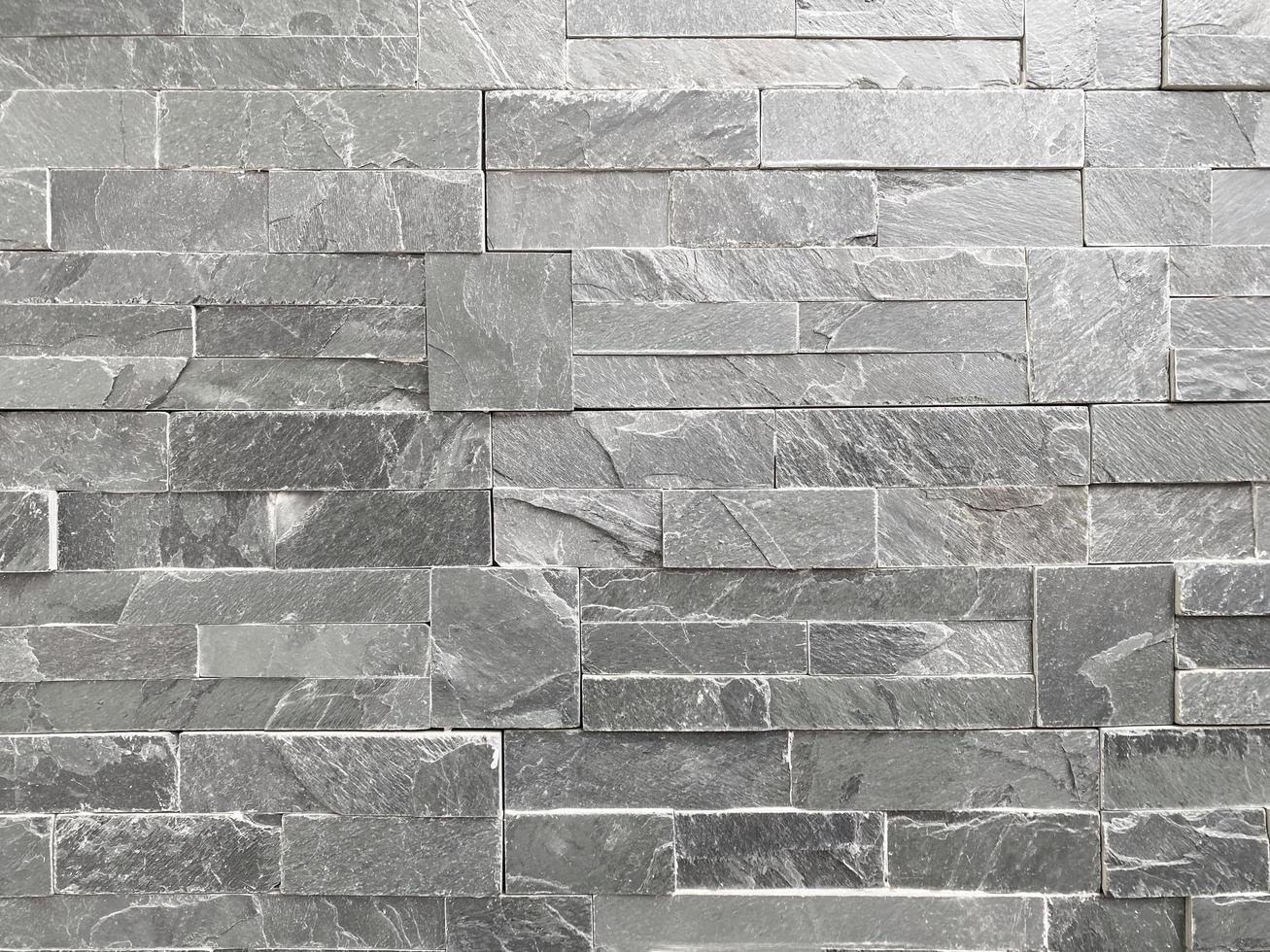 Seamless texture of white grey brick stone wall a rough surface, with ...