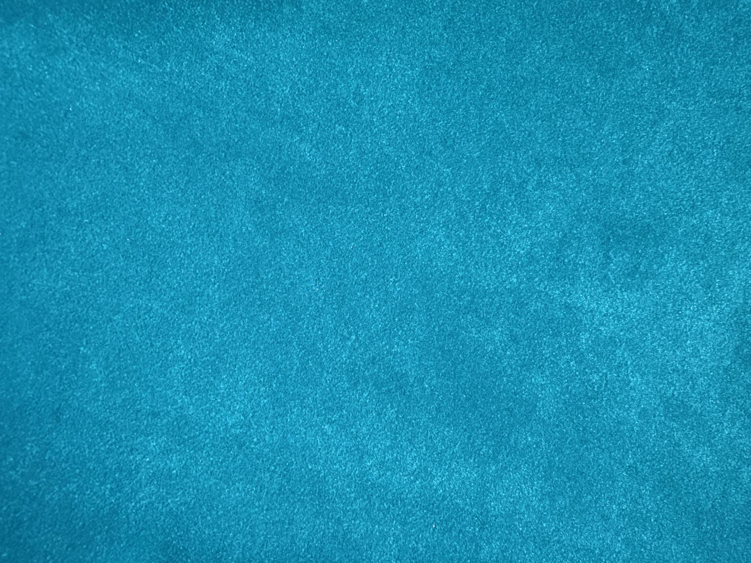 Light blue velvet fabric texture used as background. Empty blue fabric background of soft and ...