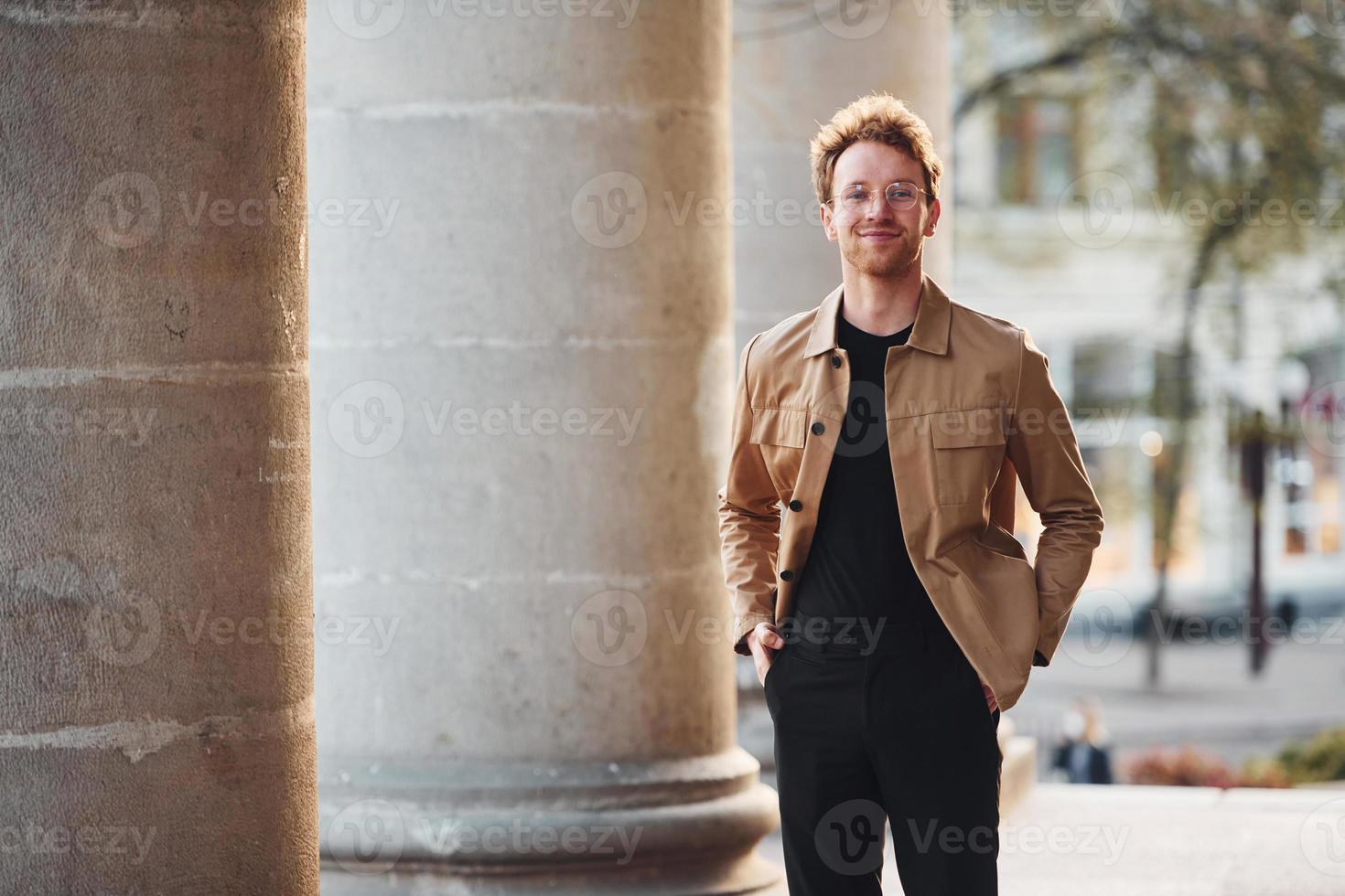 Elegant young man in formal classy clothes outdoors in the city ... Elegant young man in formal classy clothes outdoors in the city ...