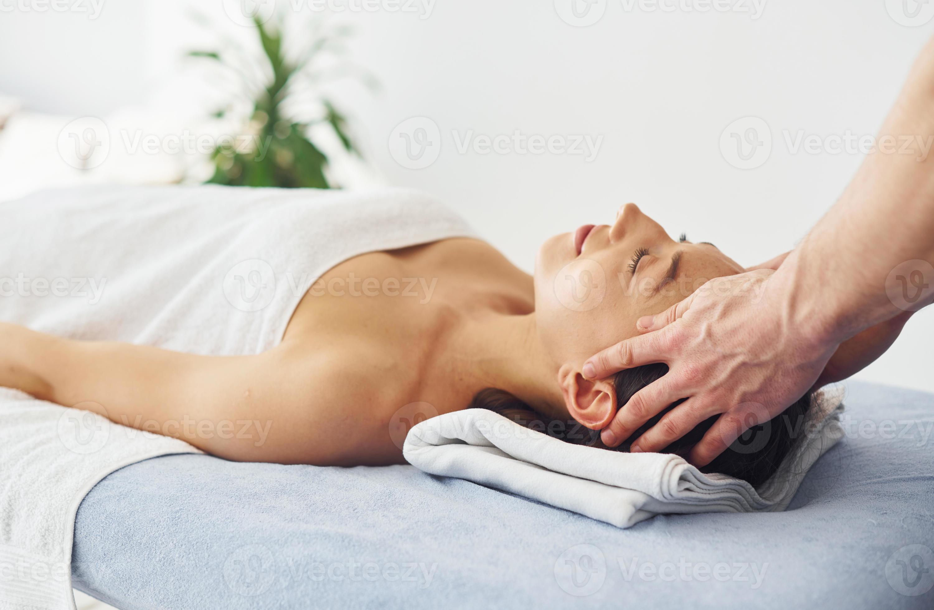 Head Massage Young Woman Is Lying Down When Man Doing Procedure To Her In Spa 15407830 Stock