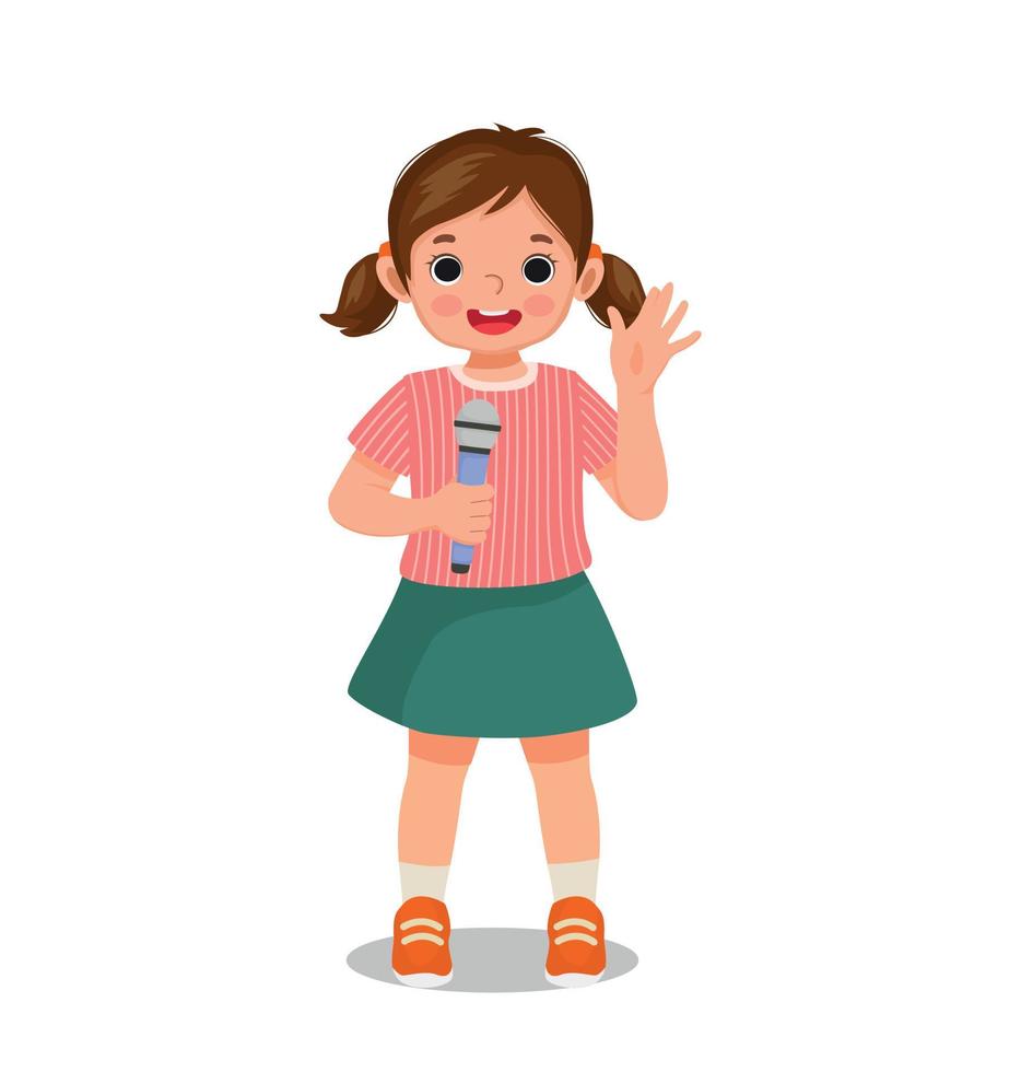 Cute little girl holding talking with microphone doing public speaking ... Cute little girl holding talking with microphone doing public speaking ...