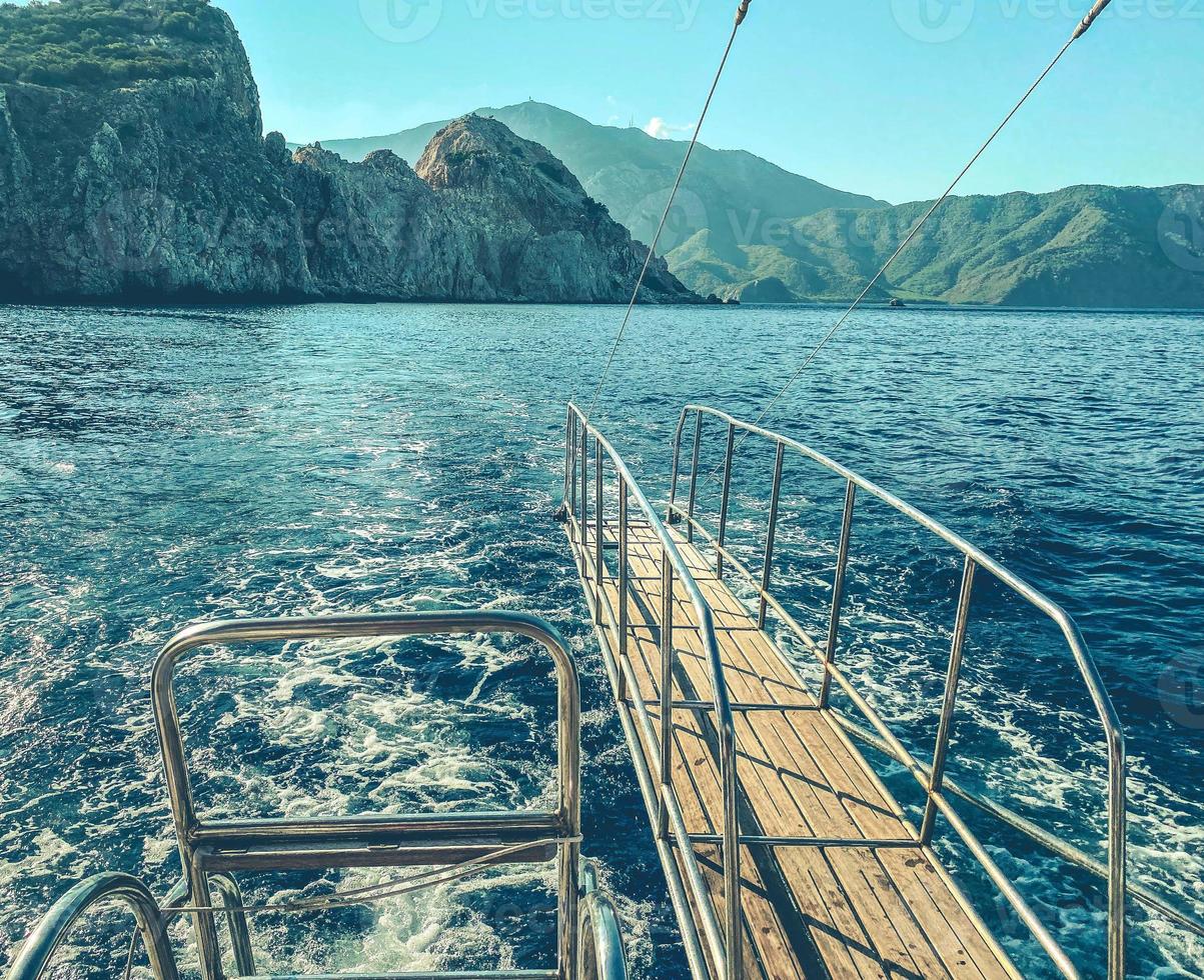 Bridge In The Open Sea Swimming From The Deck Of A Ship In Blue Water